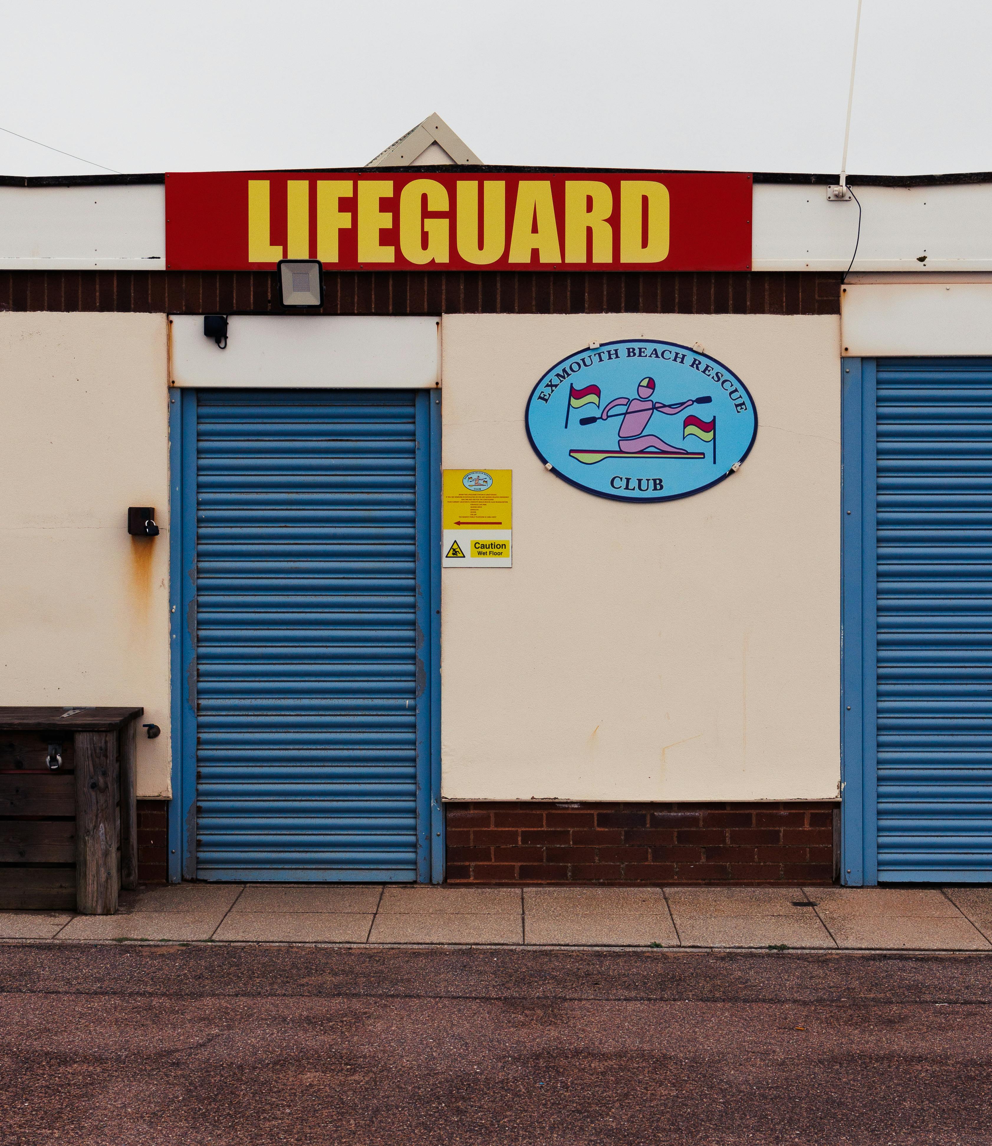 Lifeguard Text and Logo on Building Wall · Free Stock Photo