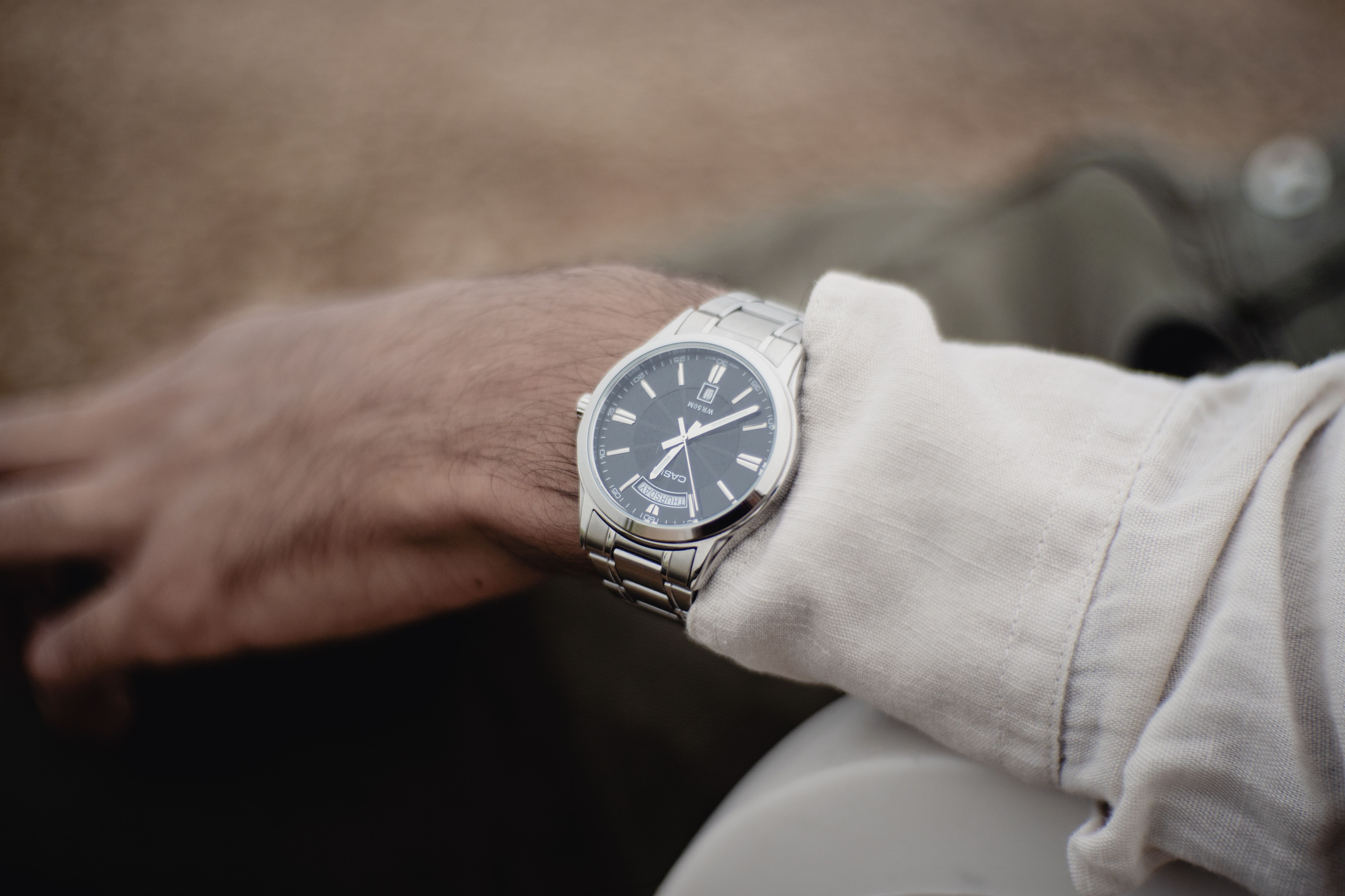 Man Wearing Silver Analog Wristwatch · Free Stock Photo