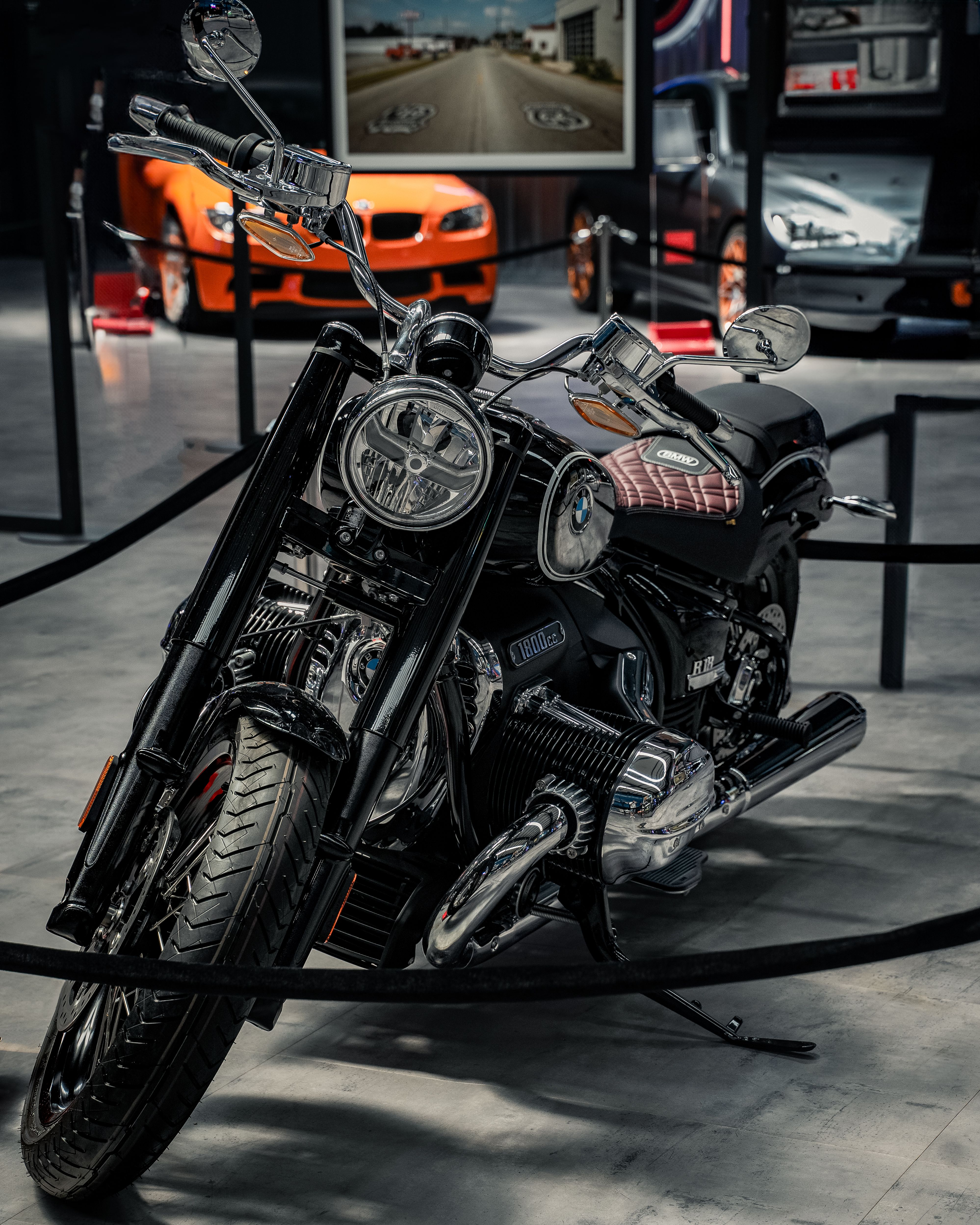 Elegant Black Motorcycle in Classic Showroom · Free Stock Photo