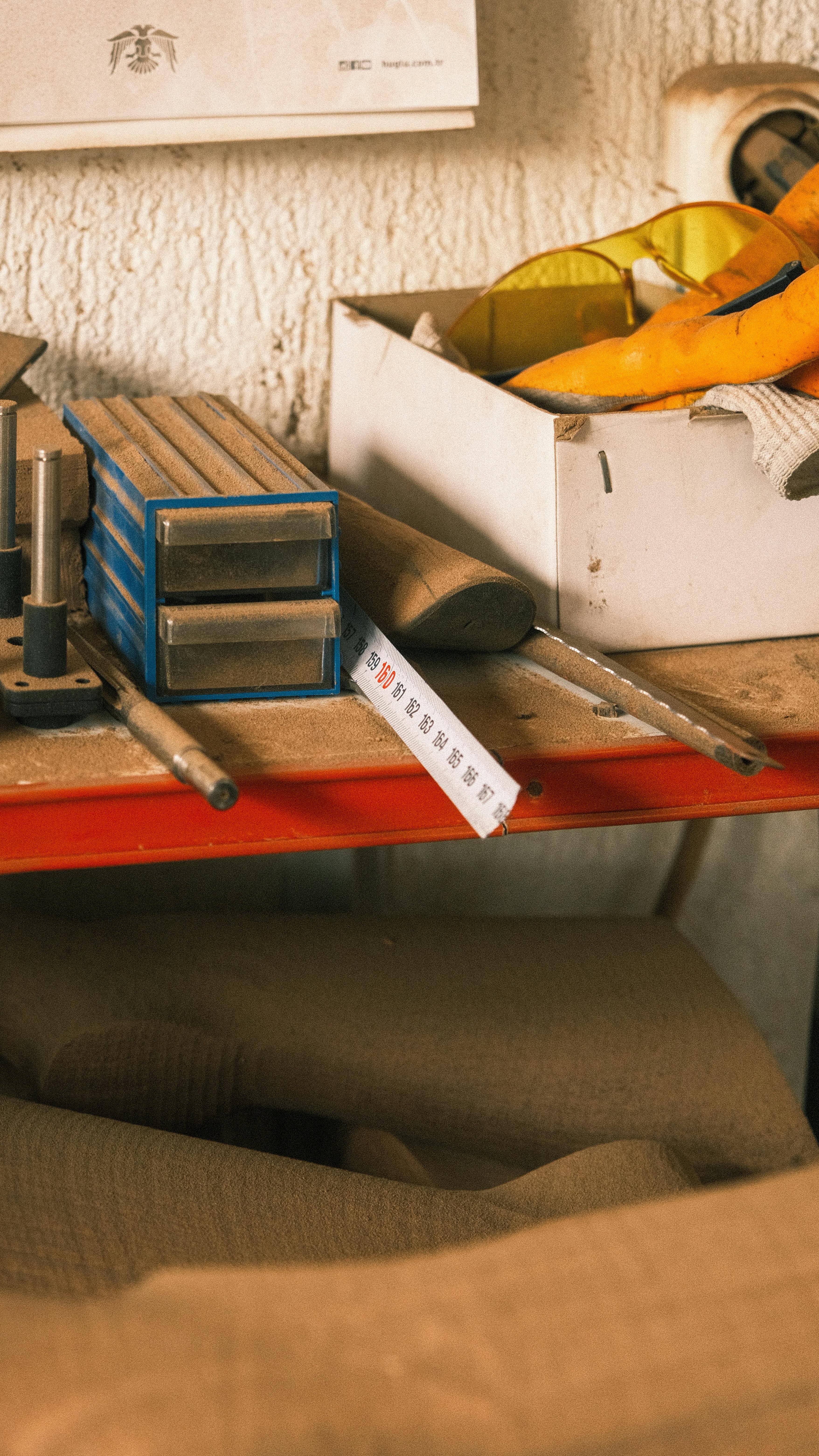 Close-up of Dusty Tools on a Shelf in a Workshop · Free Stock Photo