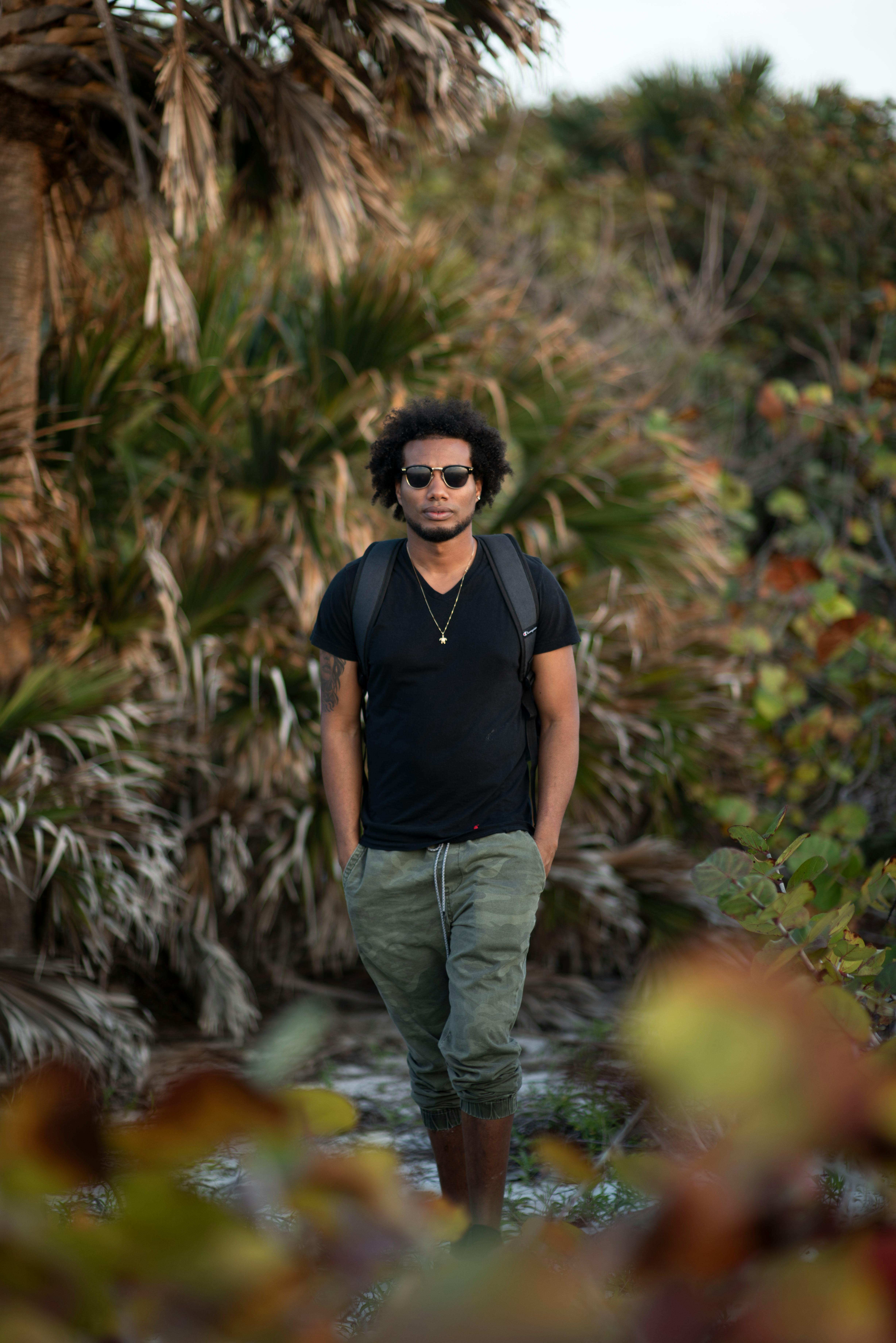 Male model walking in nature · Free Stock Photo