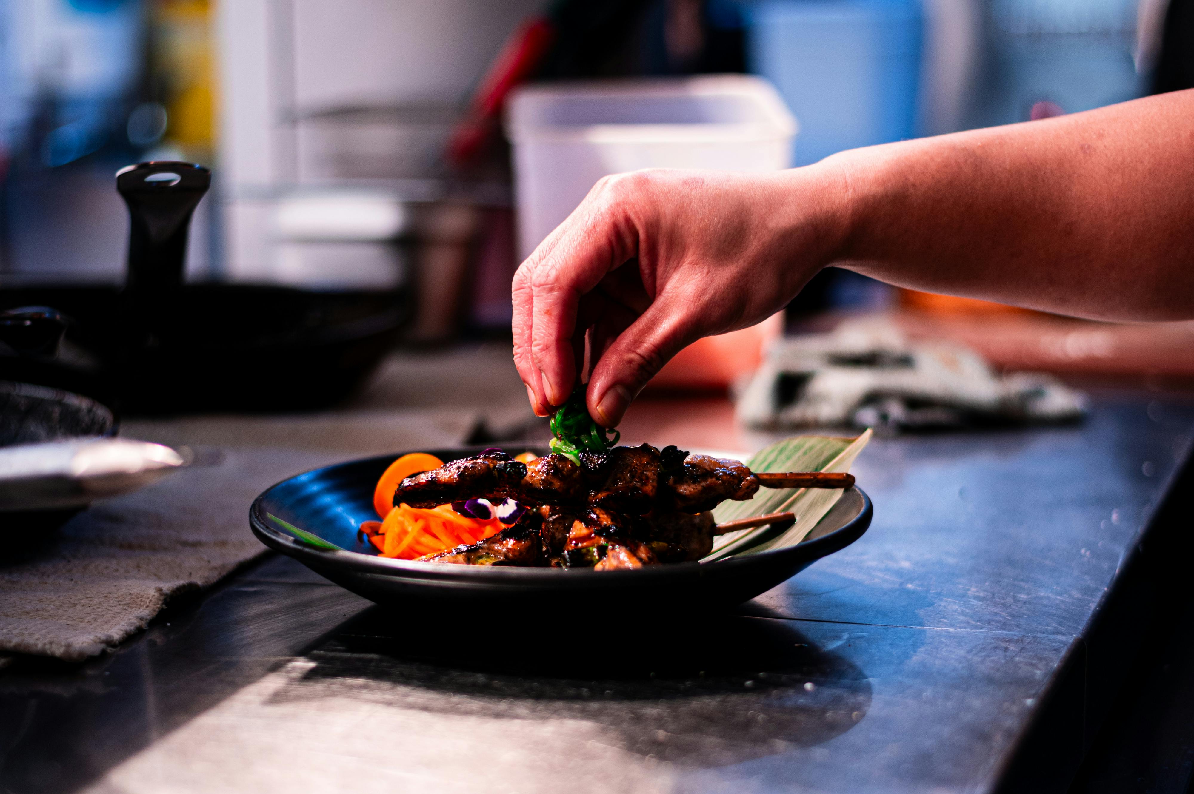 Chef preparing food for dinner · Free Stock Photo