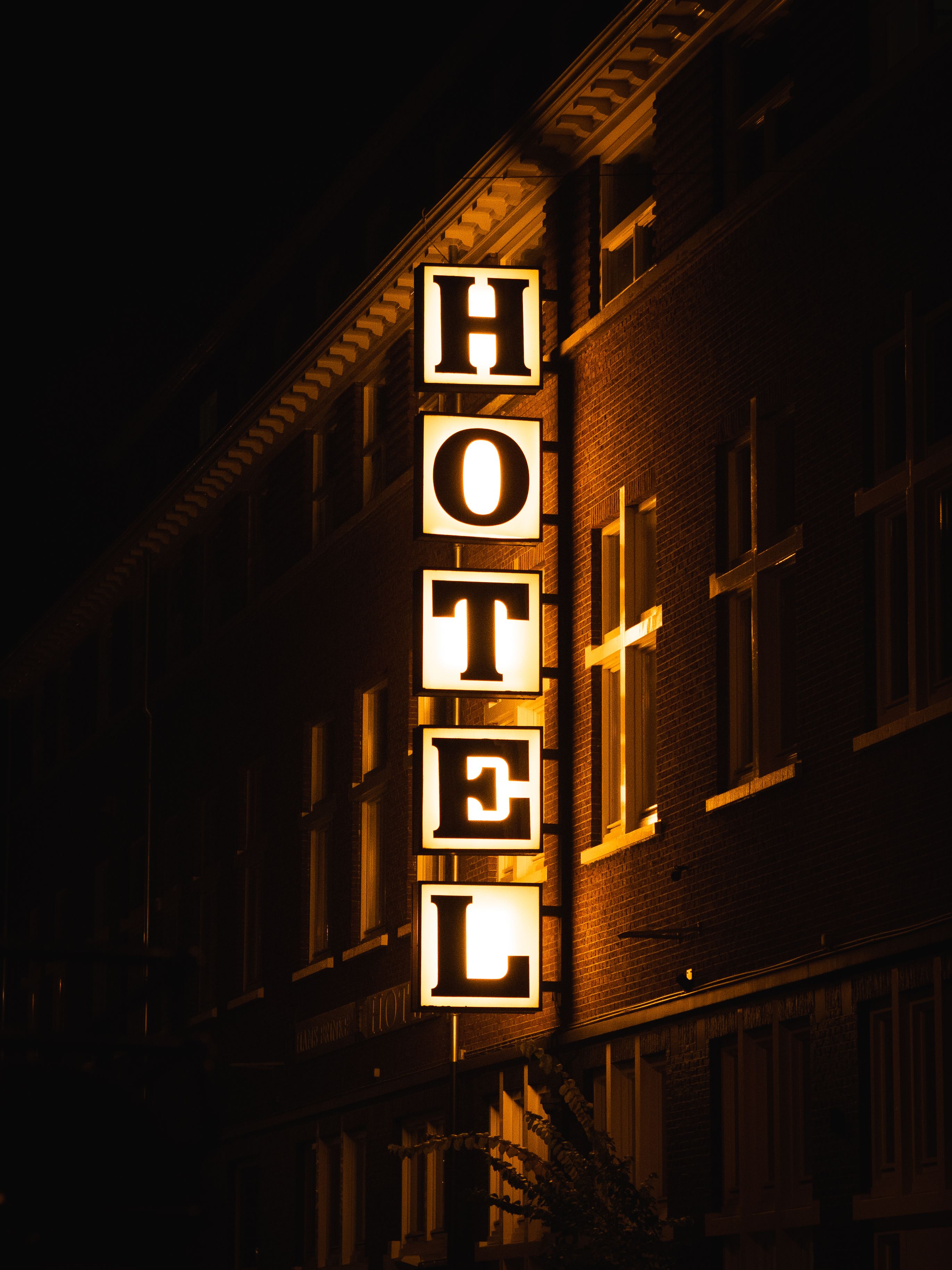 Sign of Hotel on Facade · Free Stock Photo