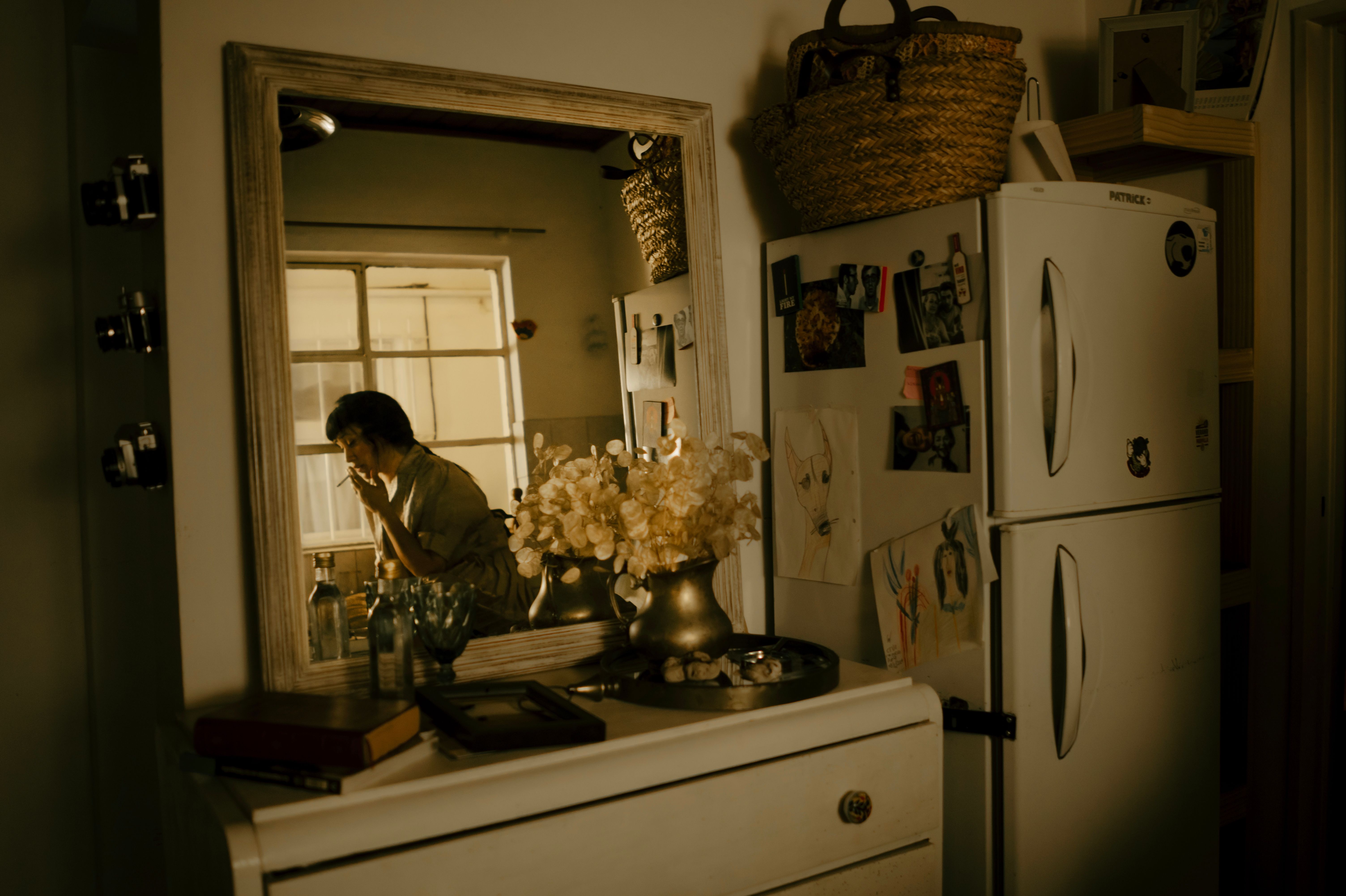 Reflection of a Woman in a Mirror · Free Stock Photo