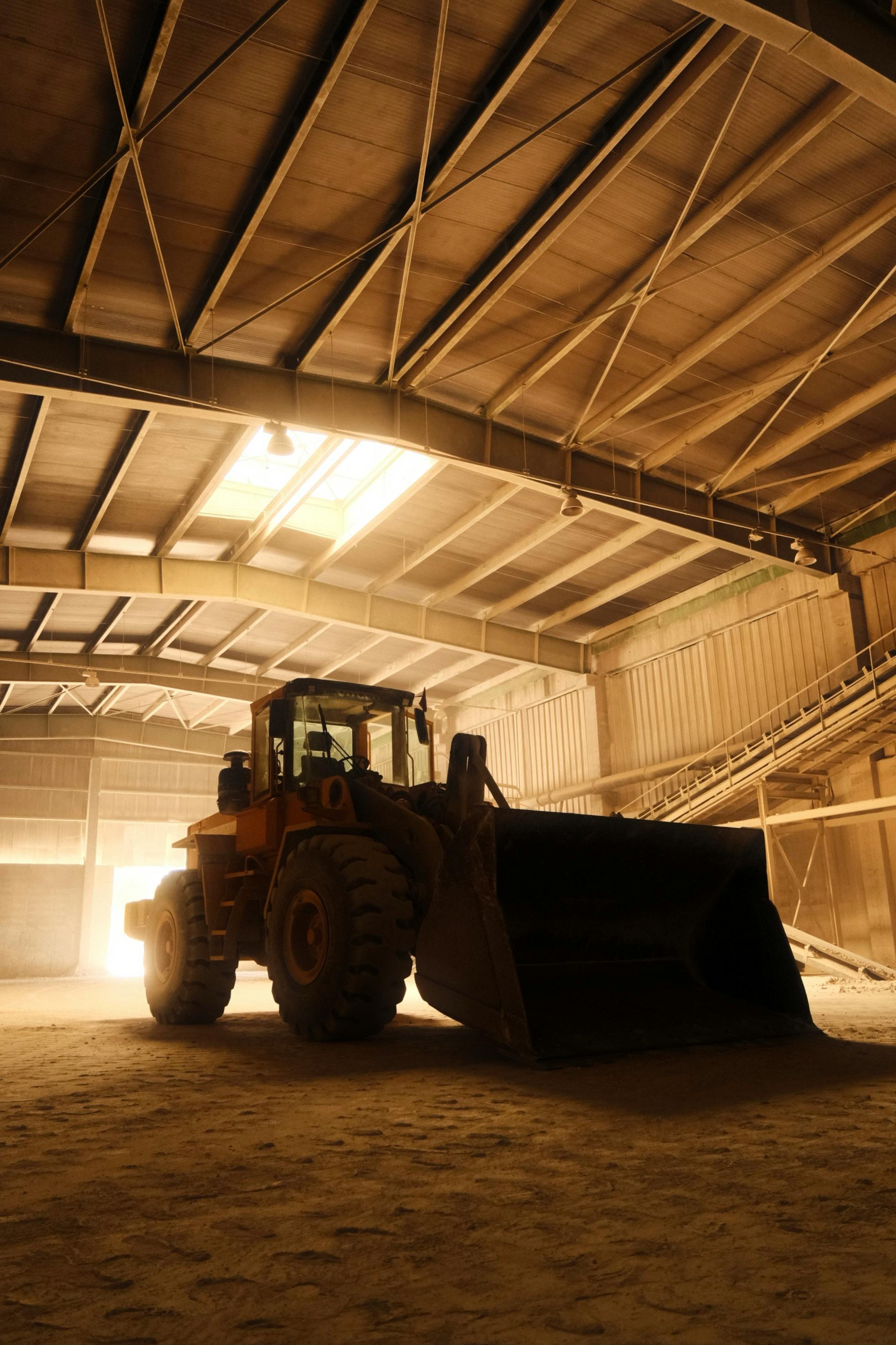 A Bulldozer in a Garage · Free Stock Photo