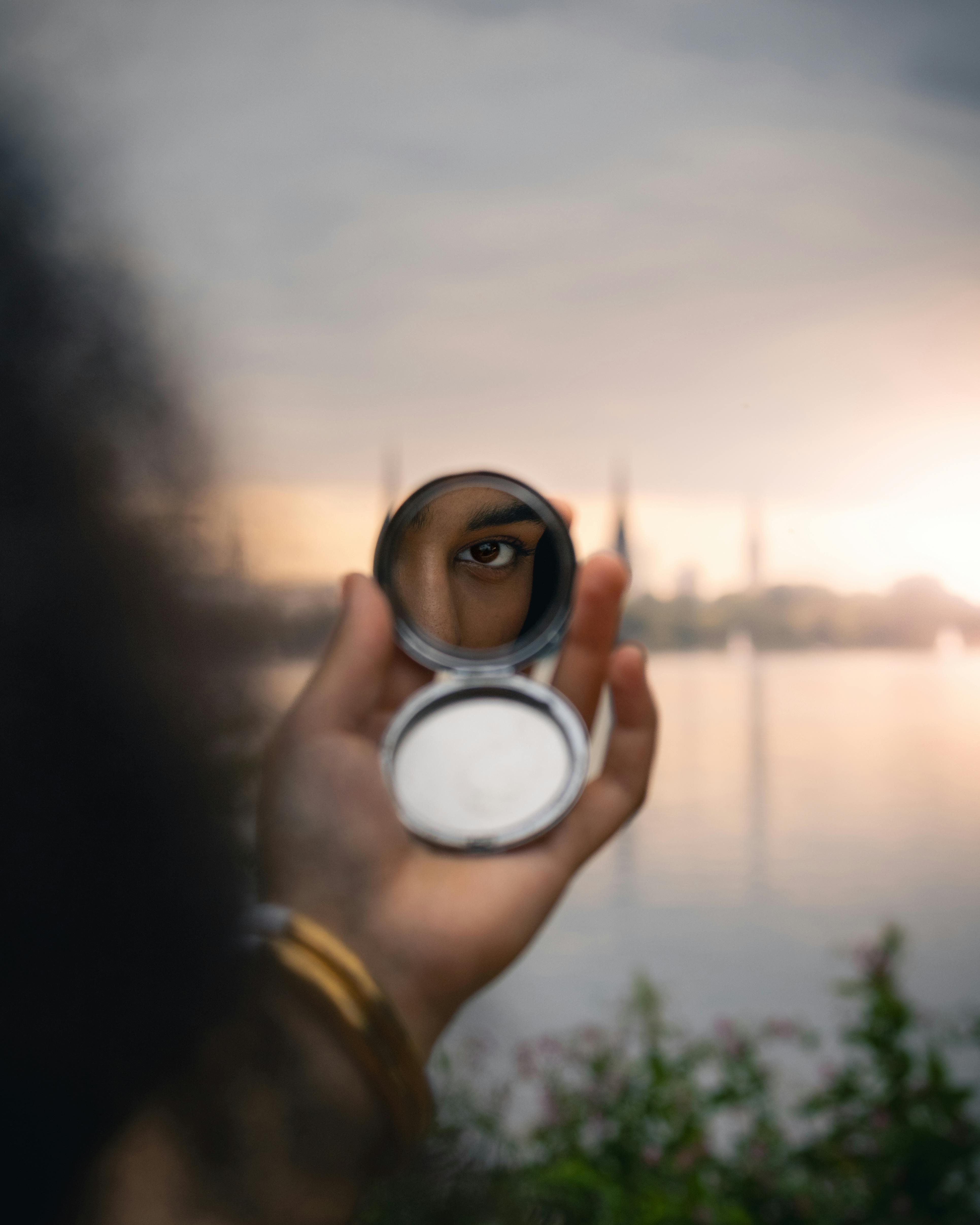 Woman Hand Holding Pocket Mirror · Free Stock Photo