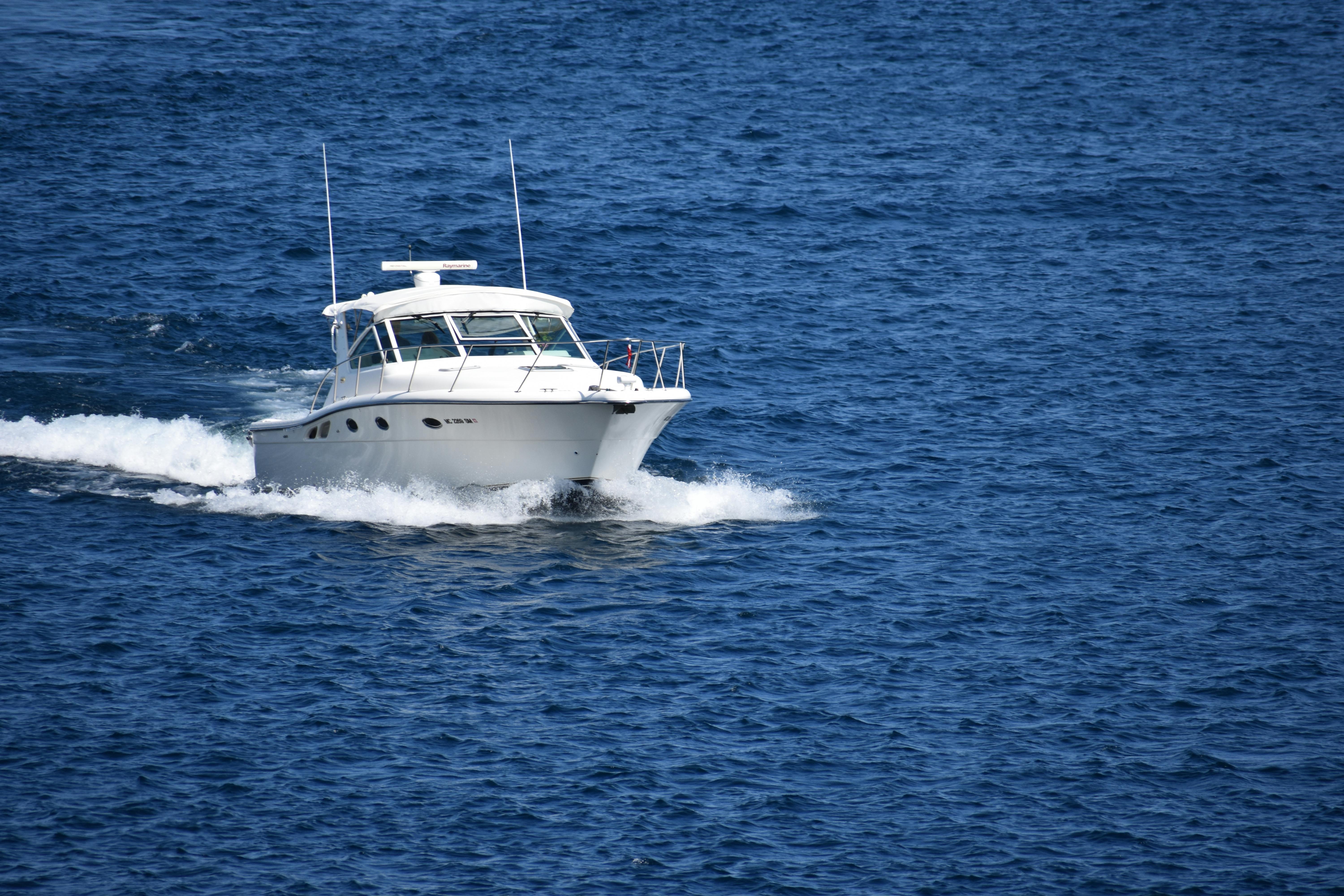 High Angle Photo of White Boat on Body of Water · Free Stock Photo