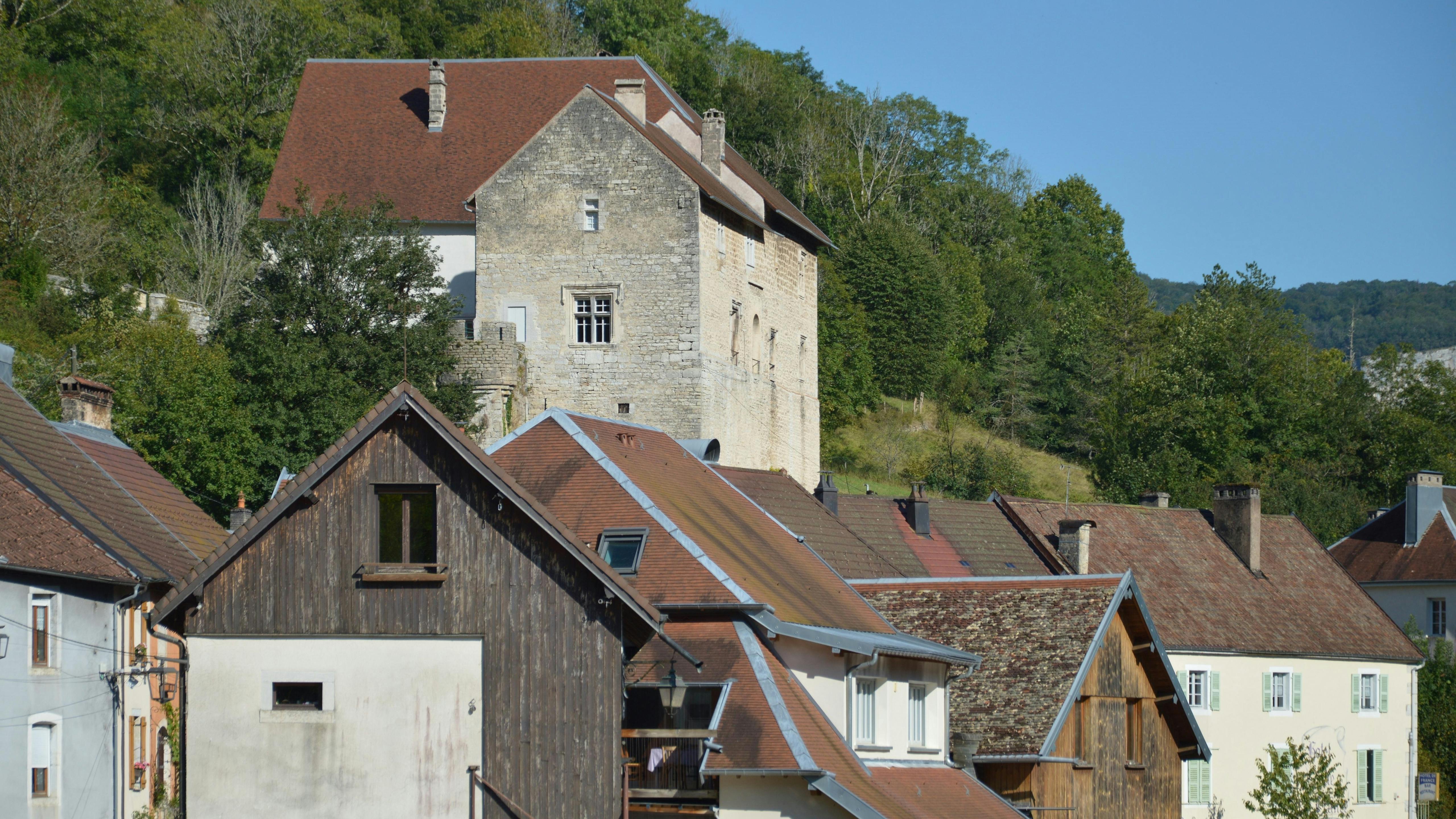 Chateau Above the Houses of Lods · Free Stock Photo
