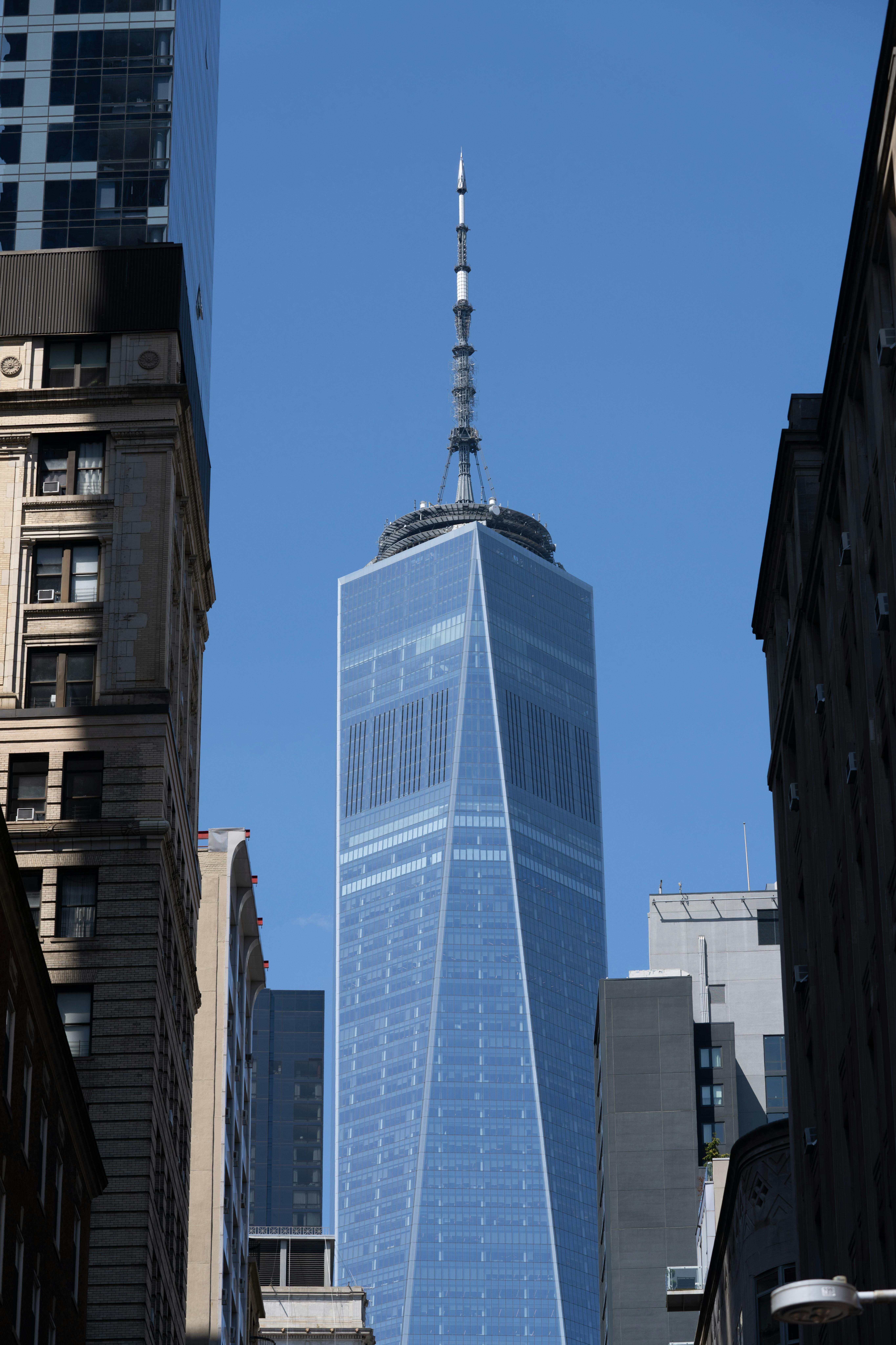 Blue High-Rise Building Towering Over The Cityscape · Free Stock Photo