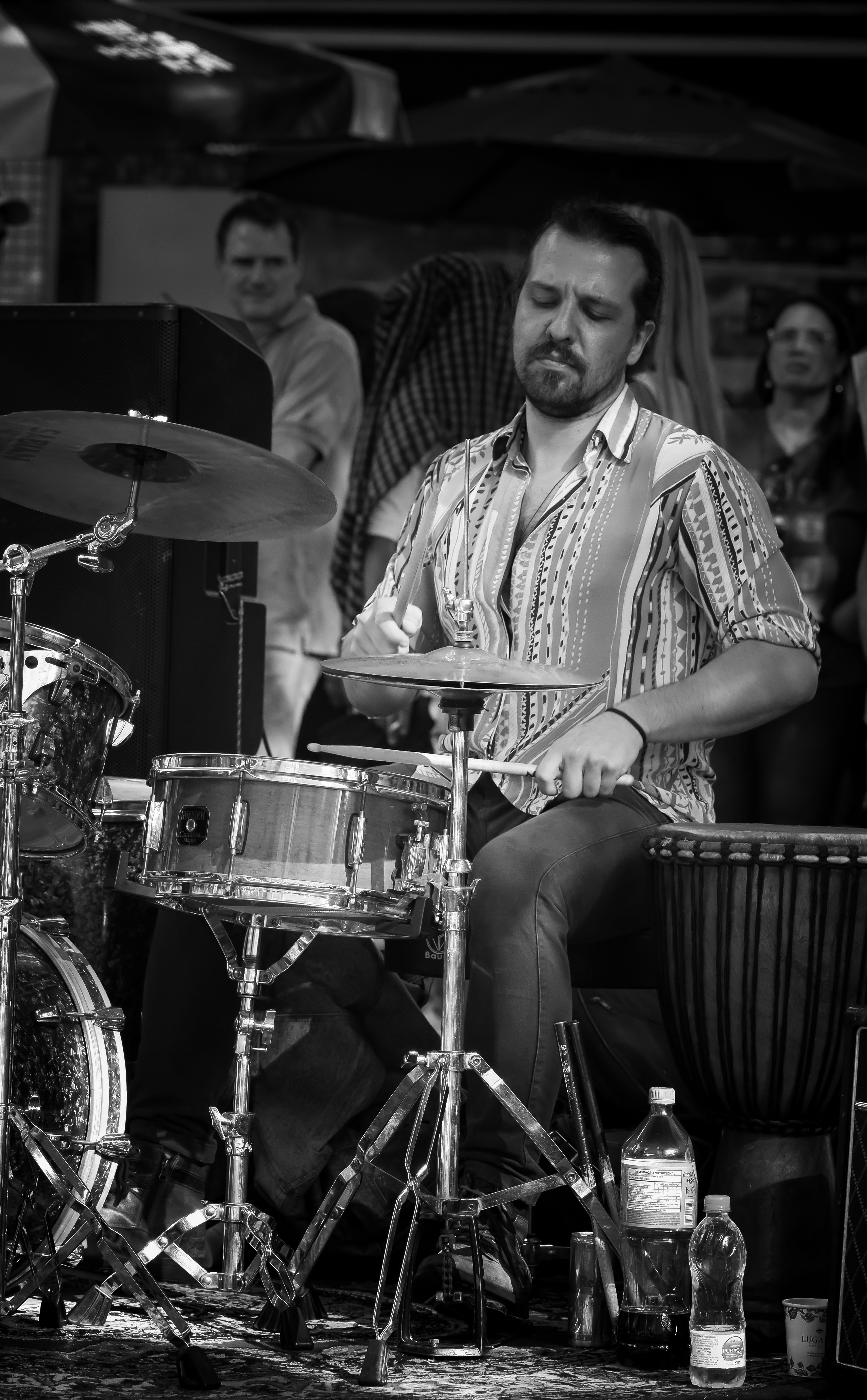 A man playing drums in a band · Free Stock Photo