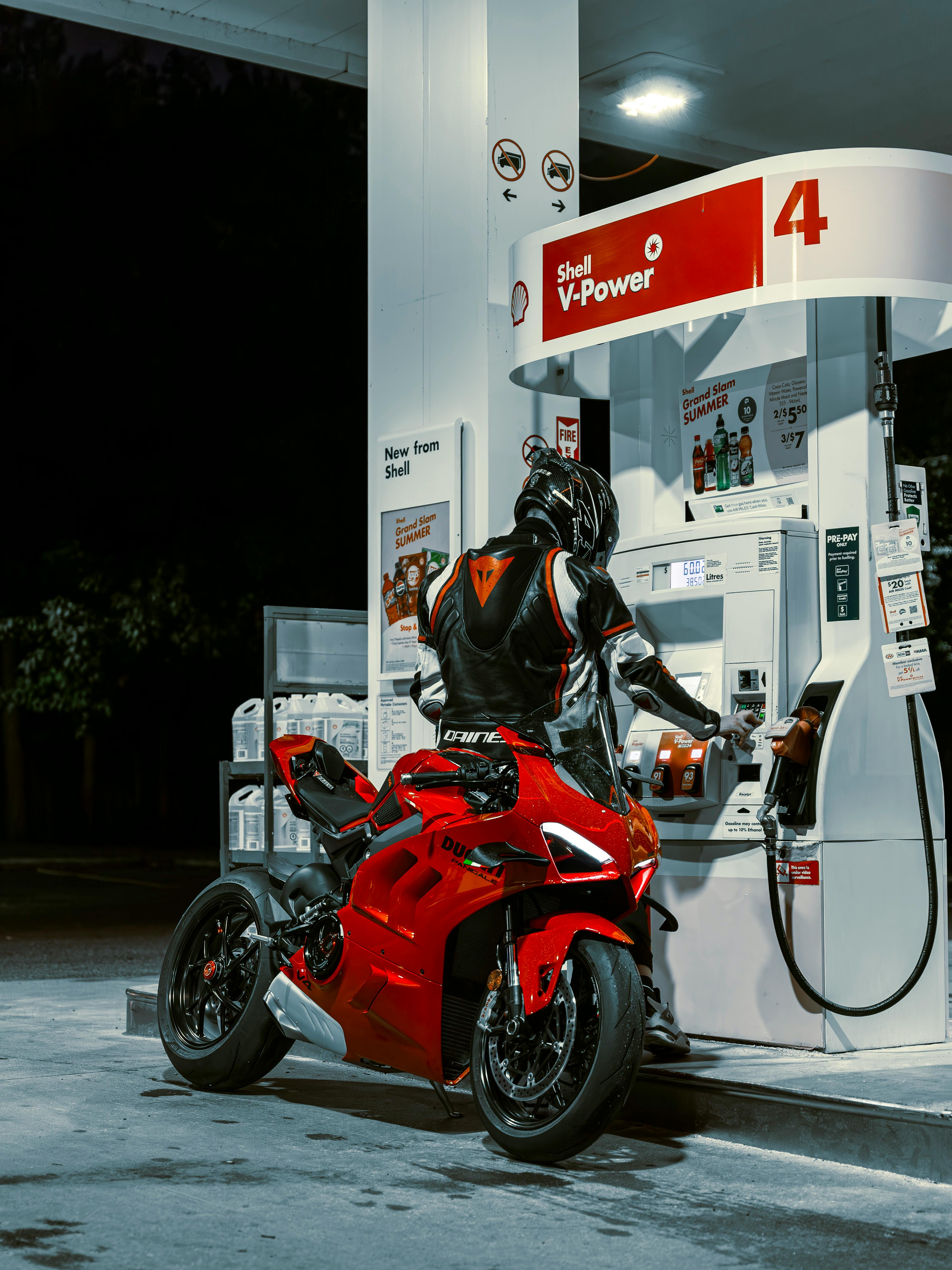 A Motorcycle at a Gas Station · Free Stock Photo