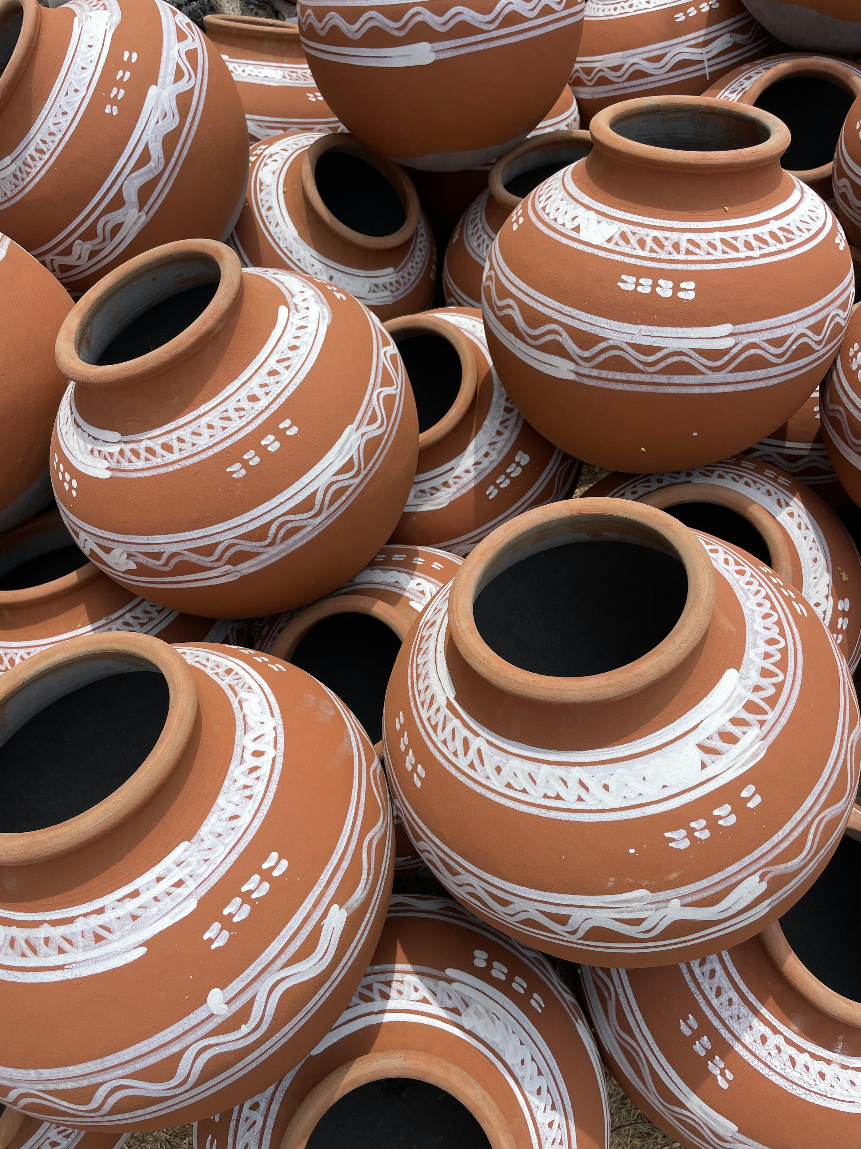 A Pile of Handmade Pots · Free Stock Photo