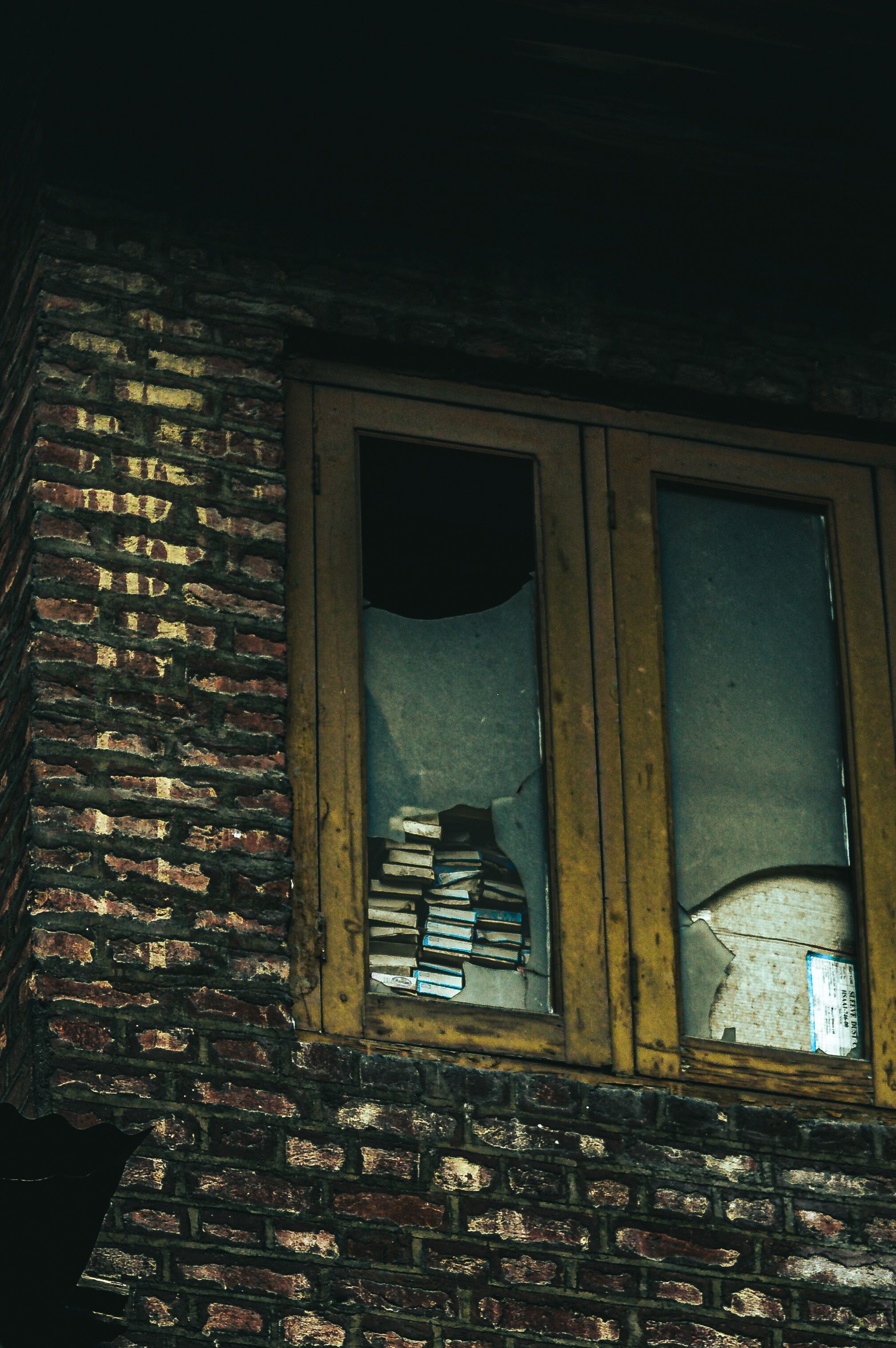 Rustic Window with Broken Glass and Books · Free Stock Photo