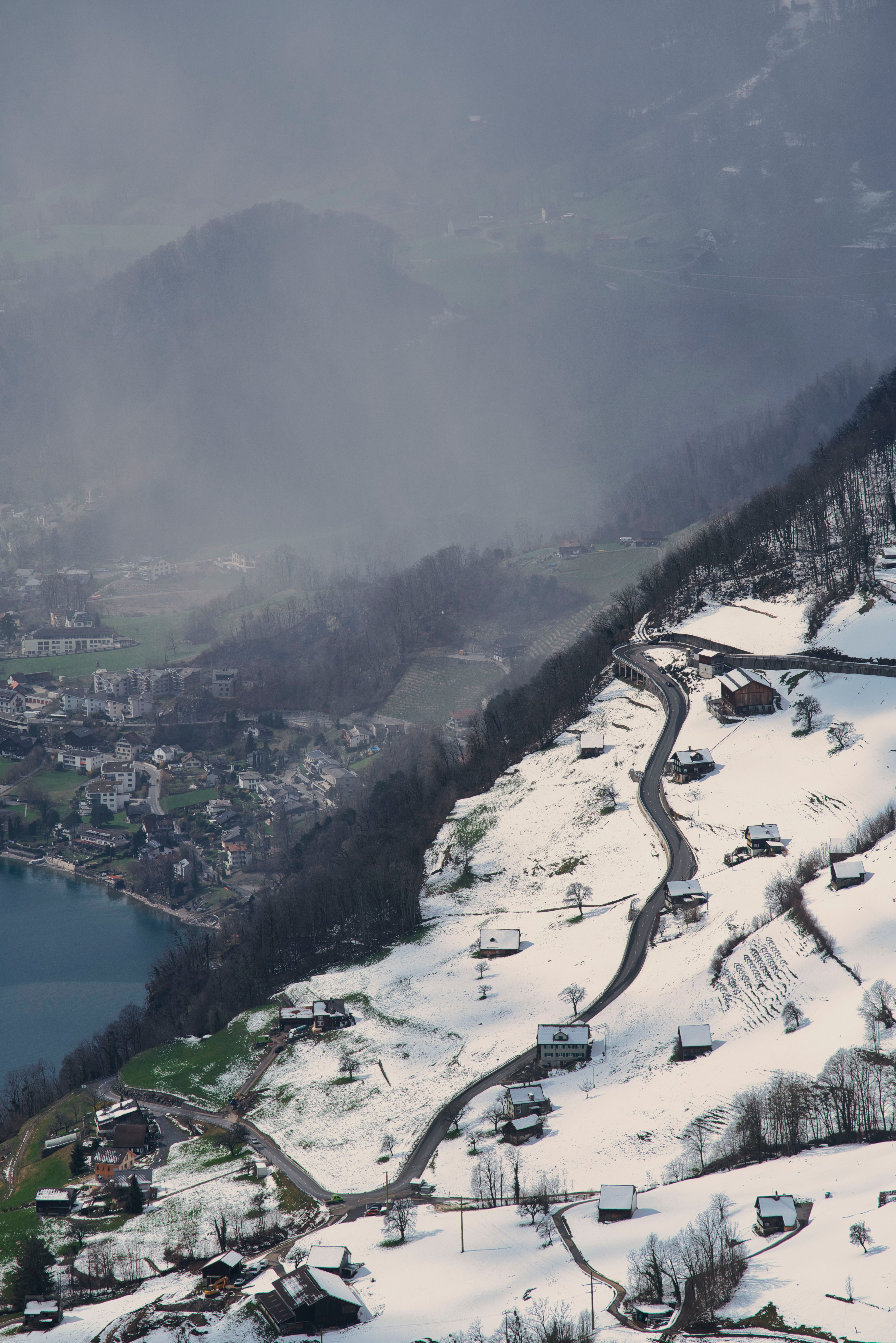 Aerial View of Snowy Mountain Village Landscape · Free Stock Photo