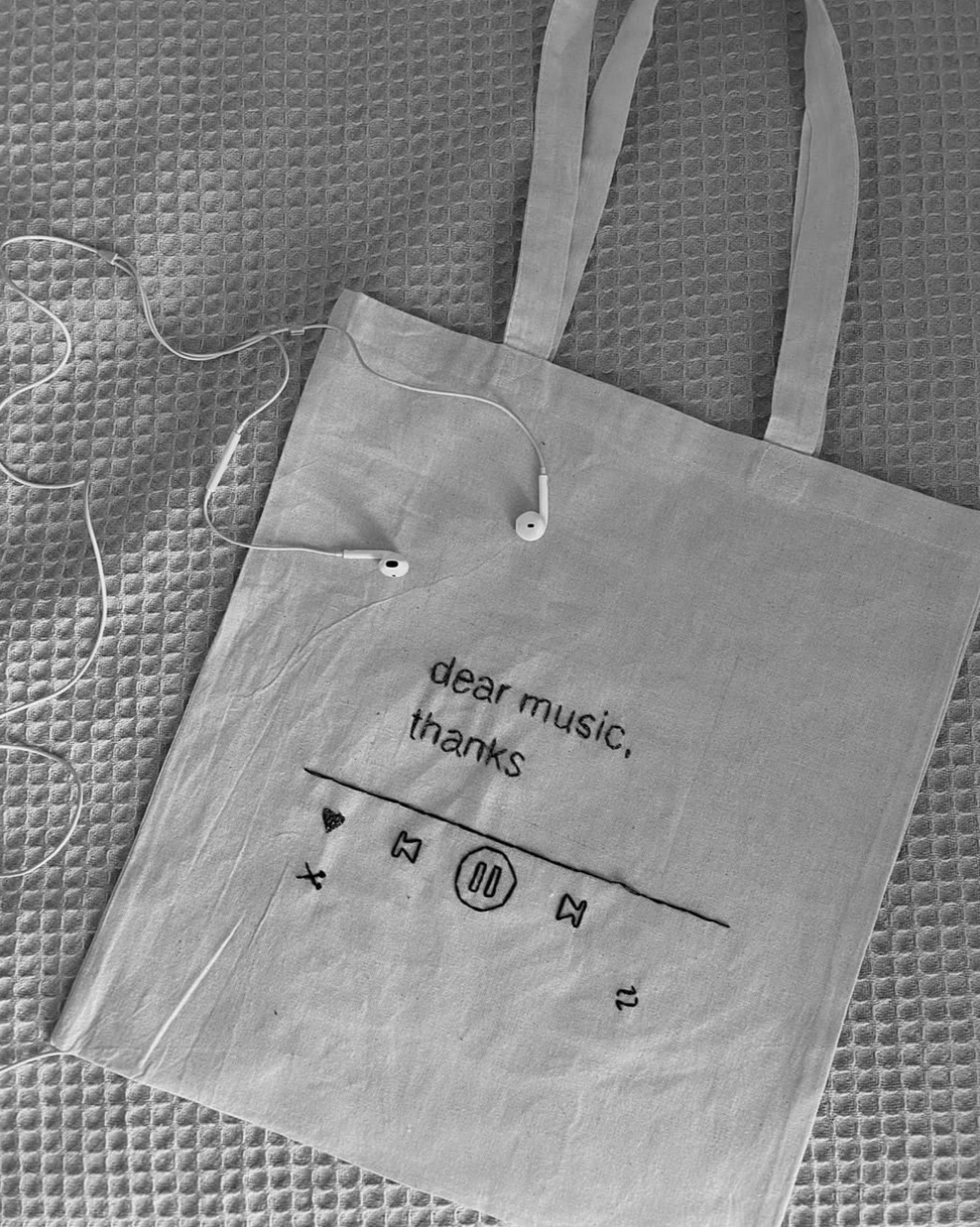 Creative tote bag with headphones and music theme · Free Stock Photo