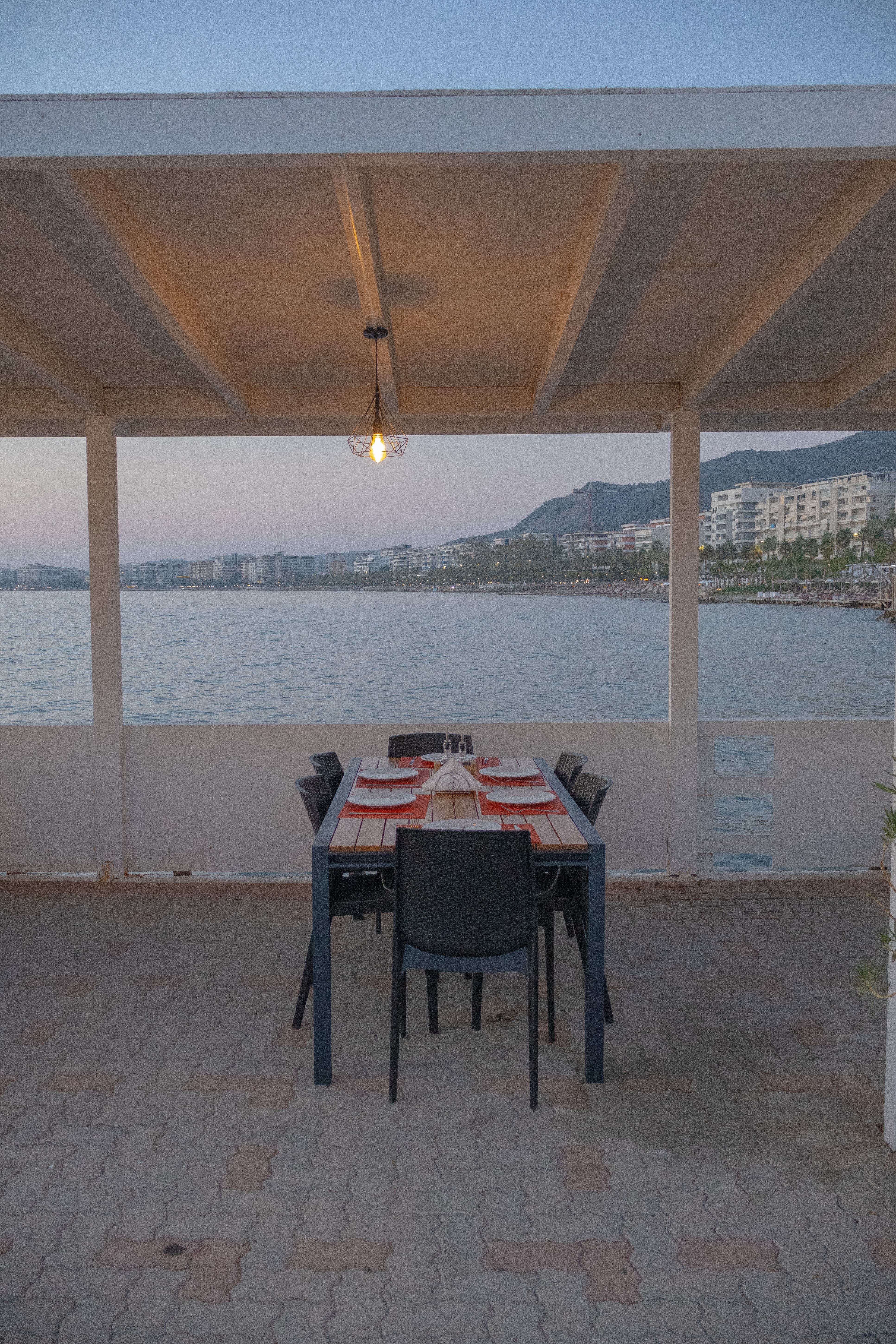 Seaside Dining at Sunset in Vlora, Albania · Free Stock Photo