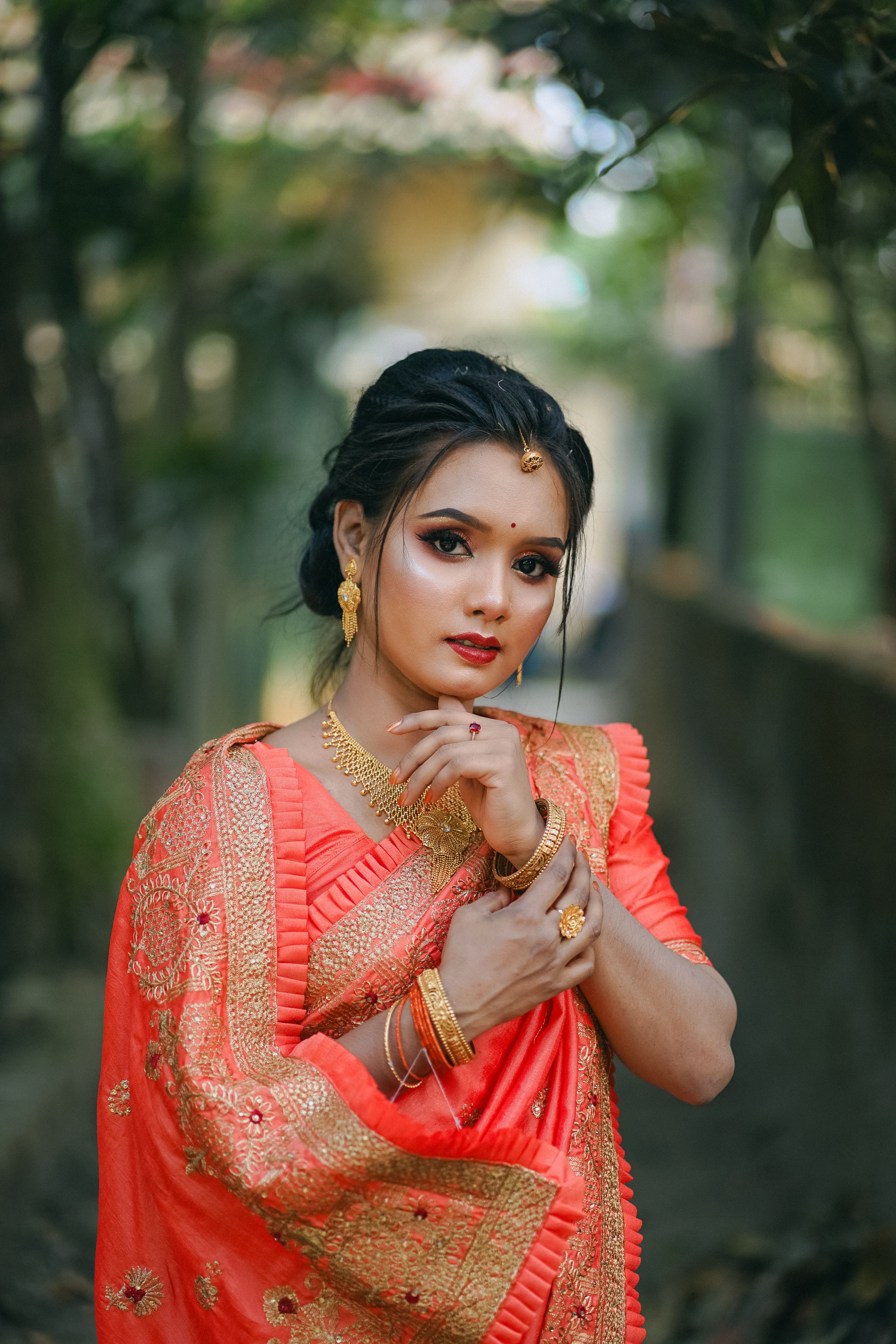A beautiful woman in a red sari · Free Stock Photo