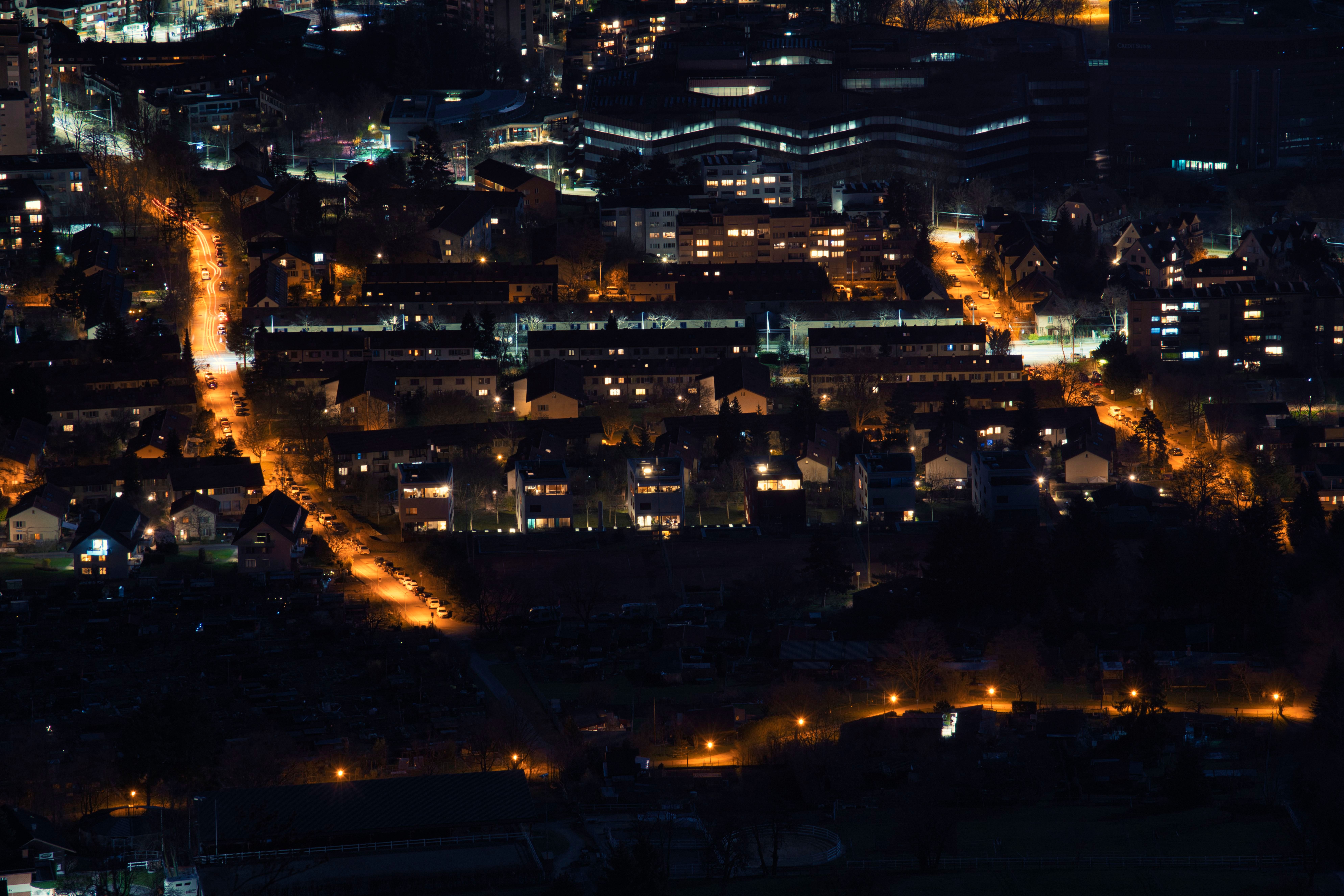 Aerial Night View of City Streets Illuminated · Free Stock Photo