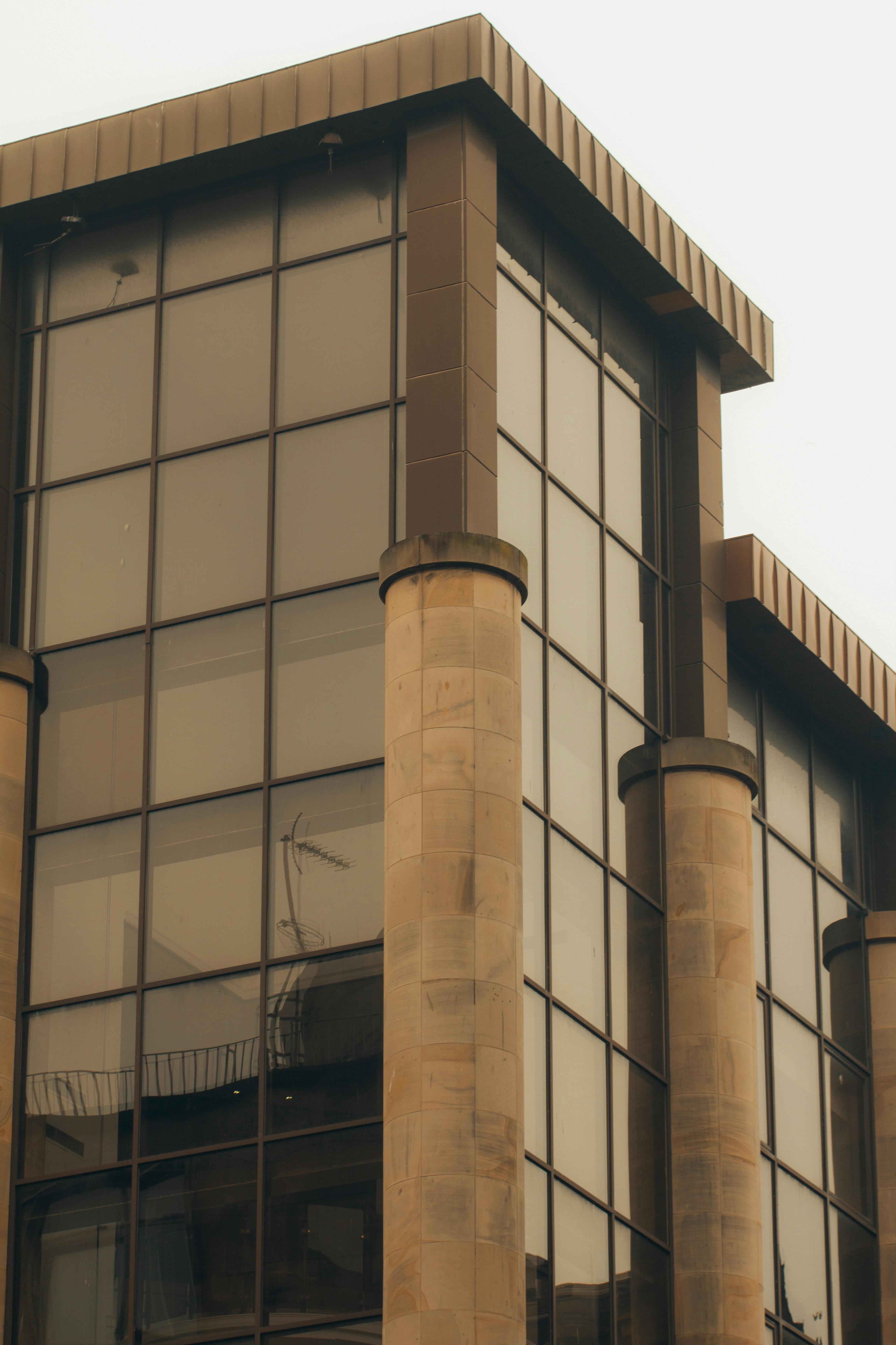 Brown Concrete Building · Free Stock Photo