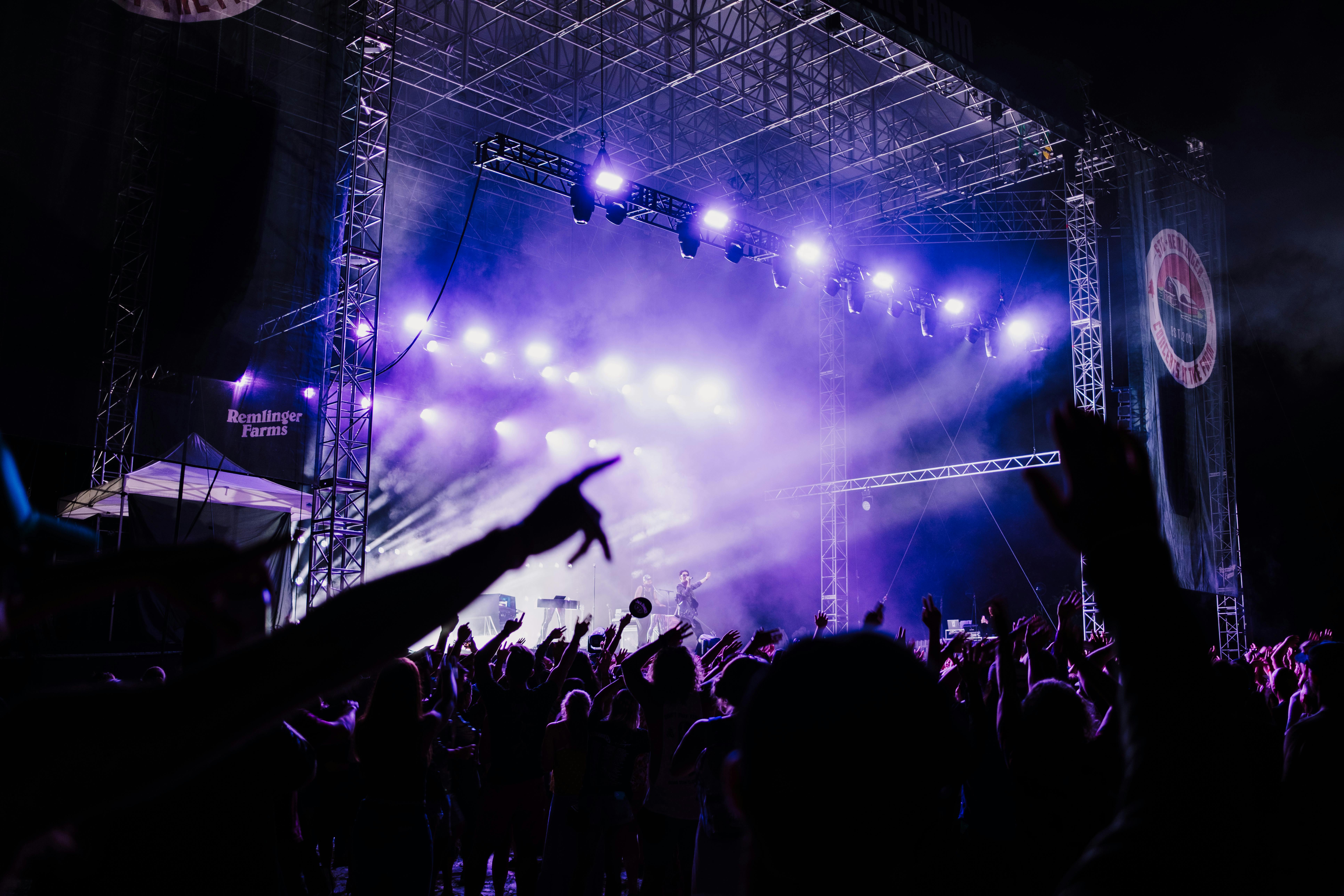 Crowd Watching Show Inside the Dark Stadium · Free Stock Photo