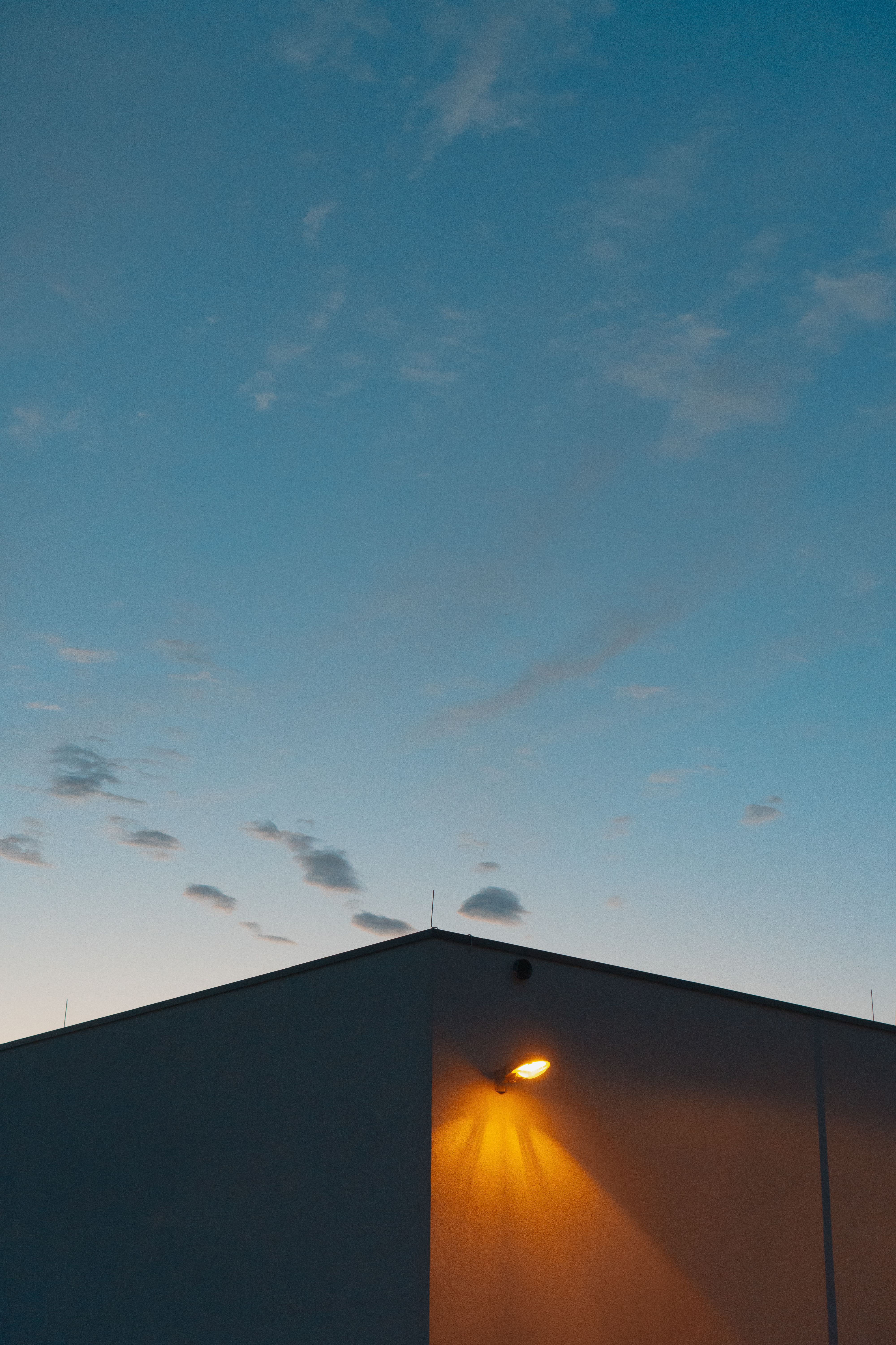 A Lamp on a Building · Free Stock Photo