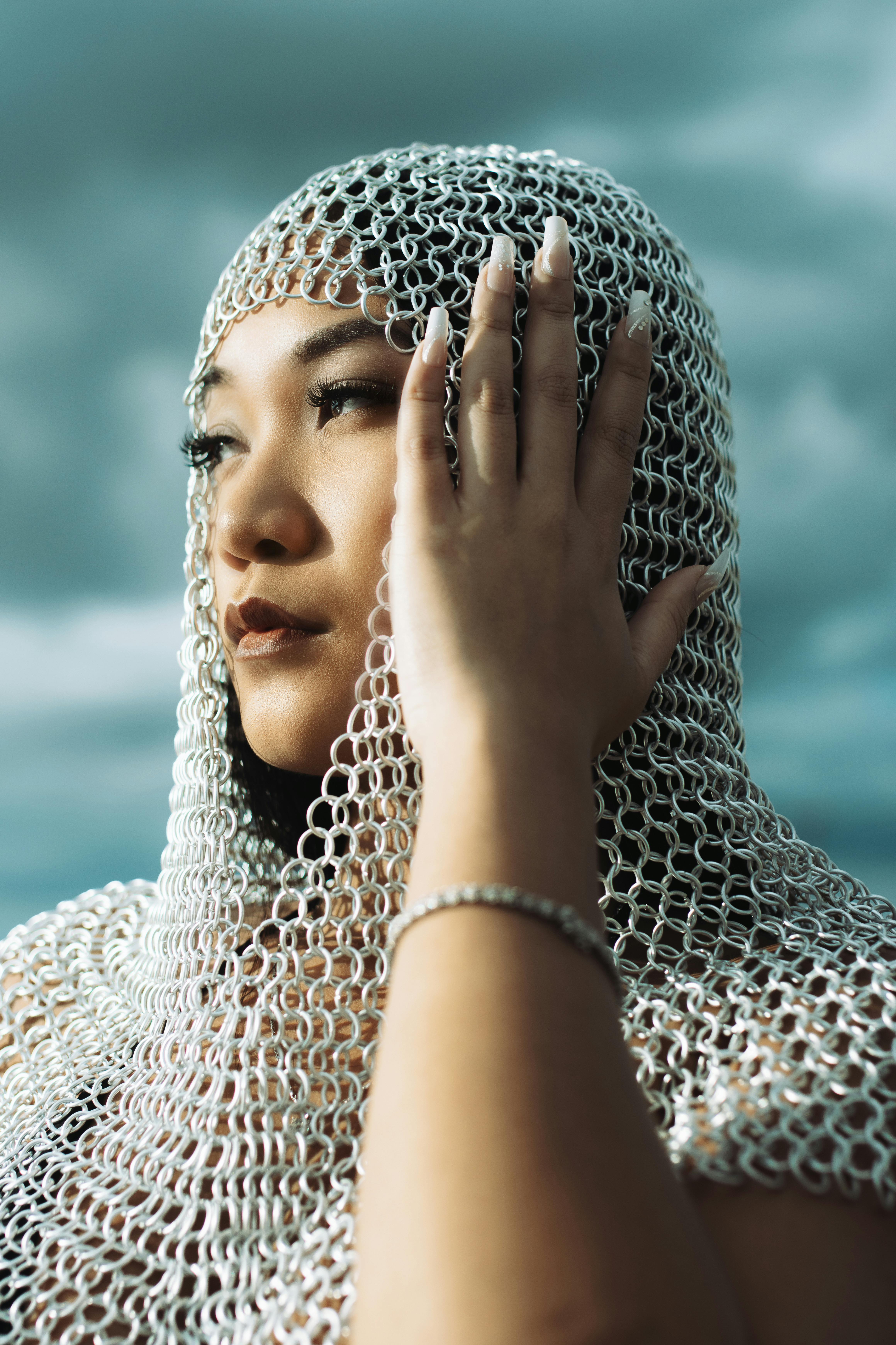 Woman with a Chains on Her Head · Free Stock Photo