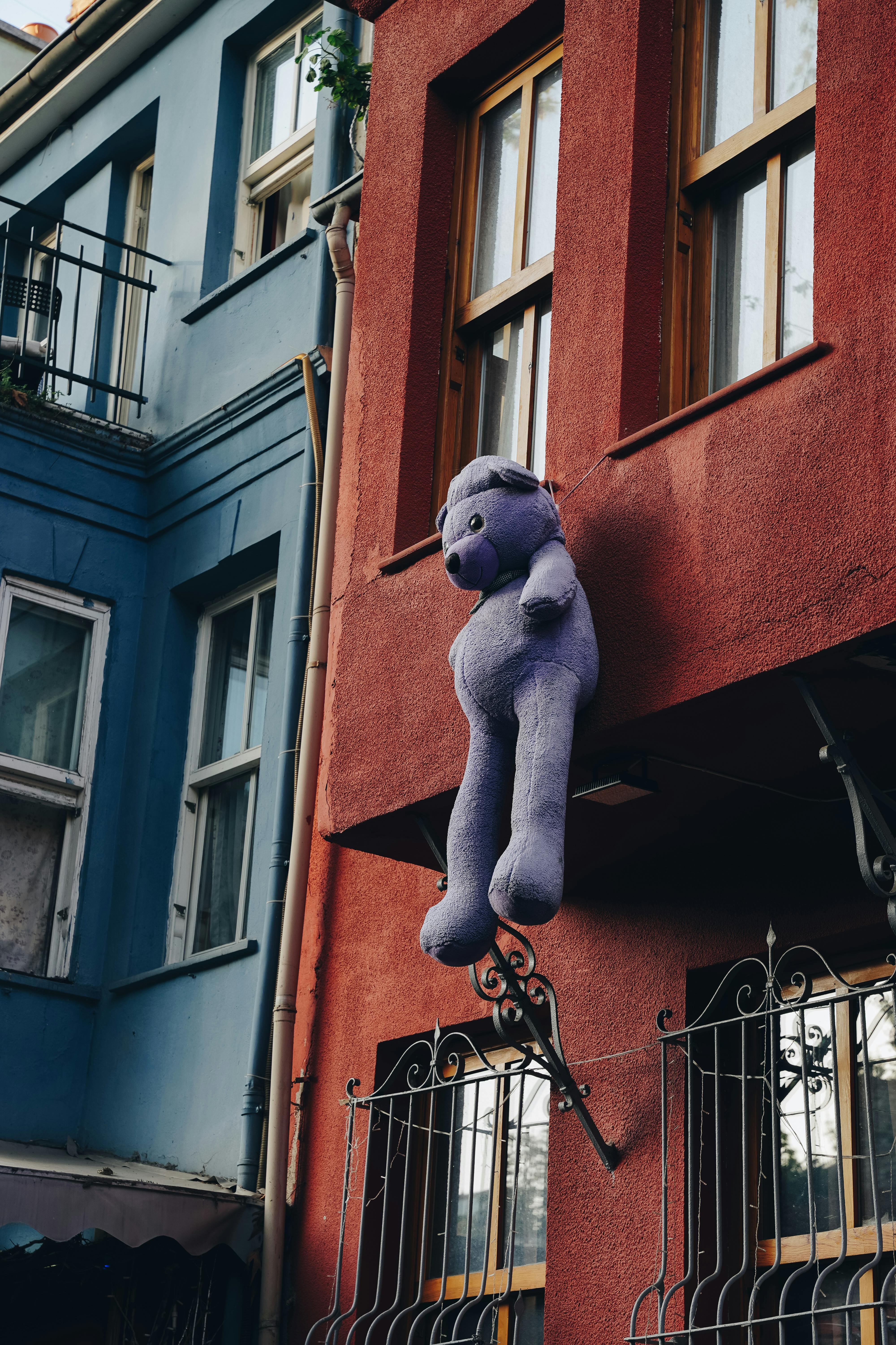 Pink Panther Plush Toy on Brown Bench Miniature · Free Stock Photo