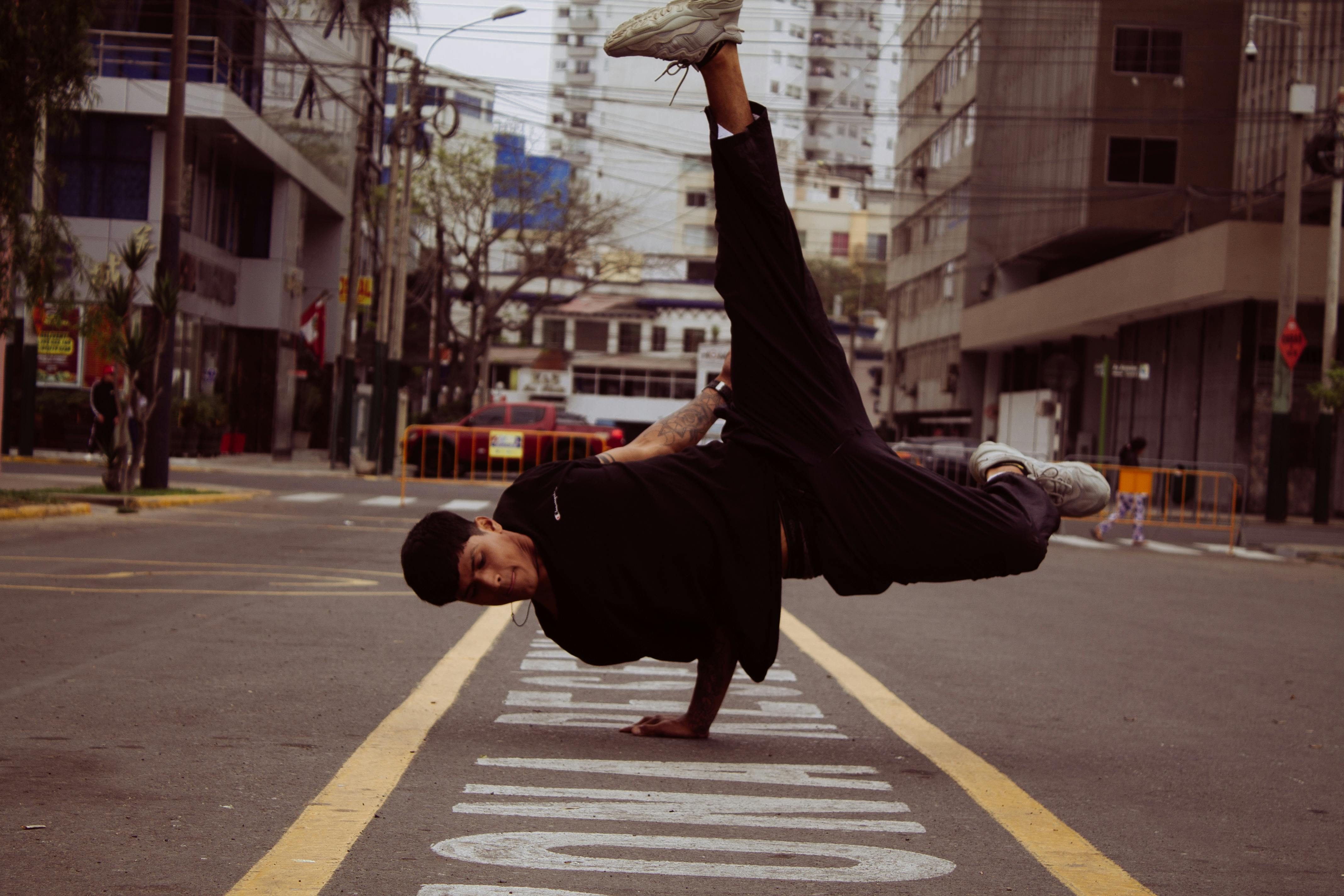 Man Breakdancing In the Street · Free Stock Photo
