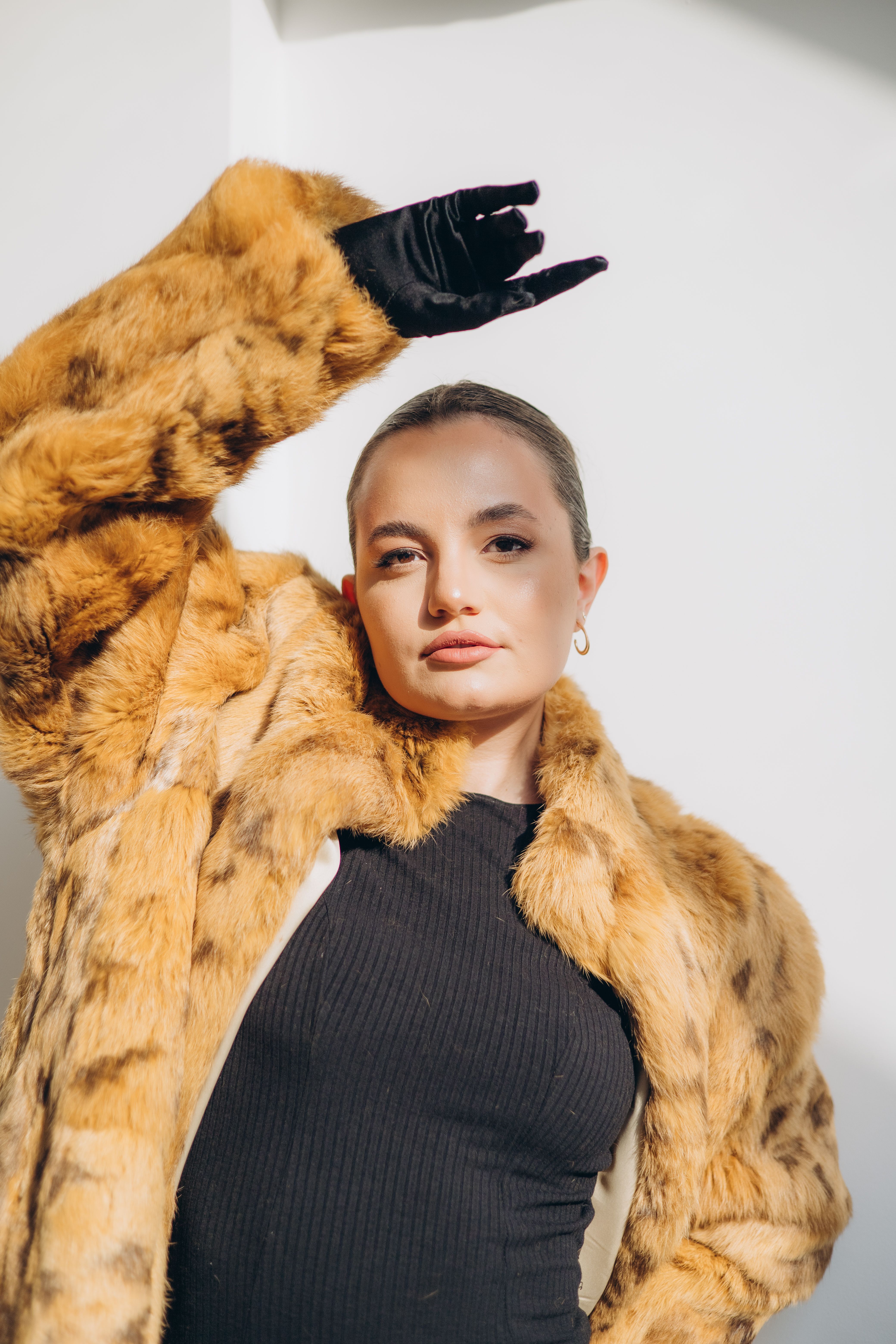 Woman in Fur Coat Posing in Studio · Free Stock Photo