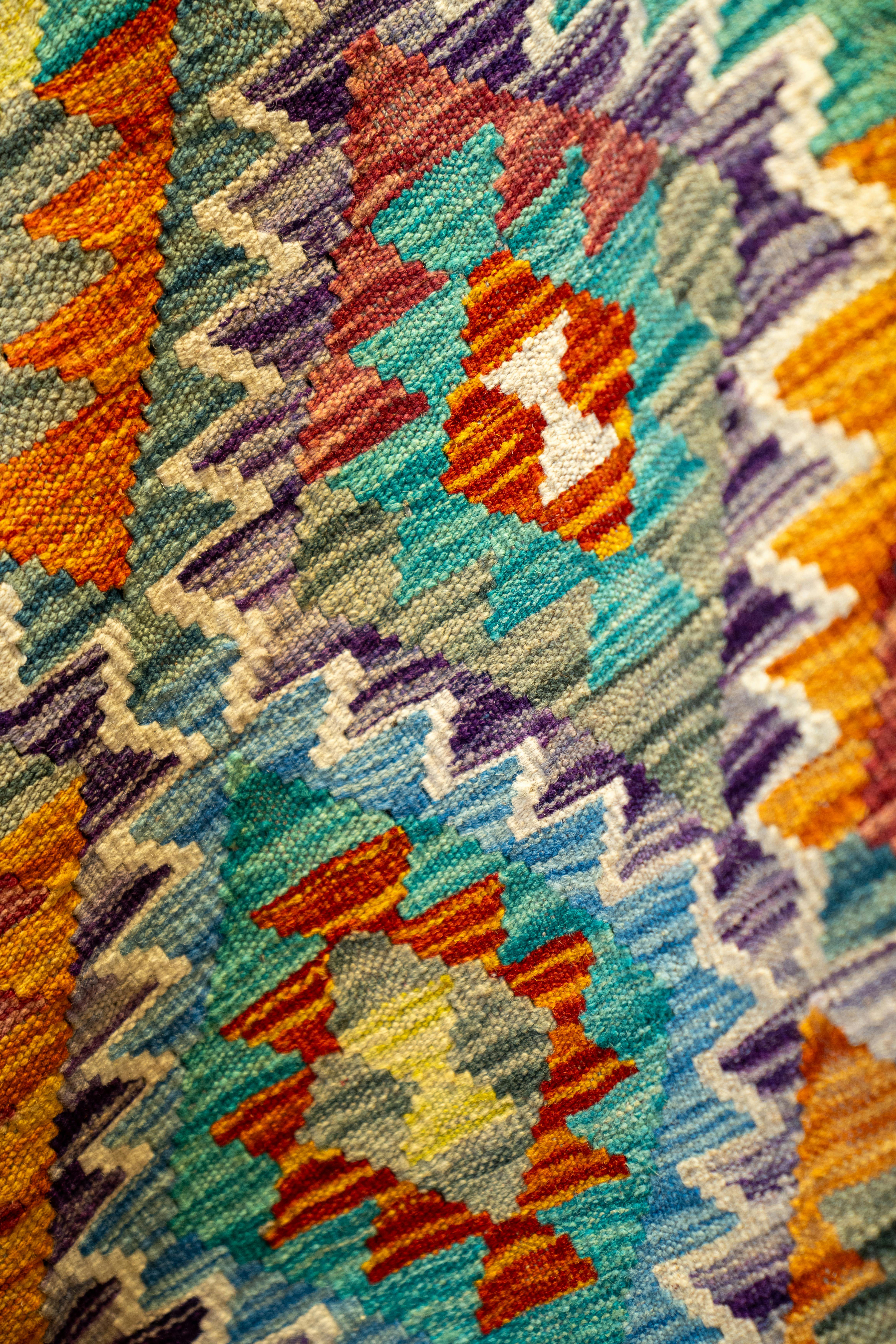 Low Angle Shot Of A Of Multi Colored Textile Attached Together On A ...