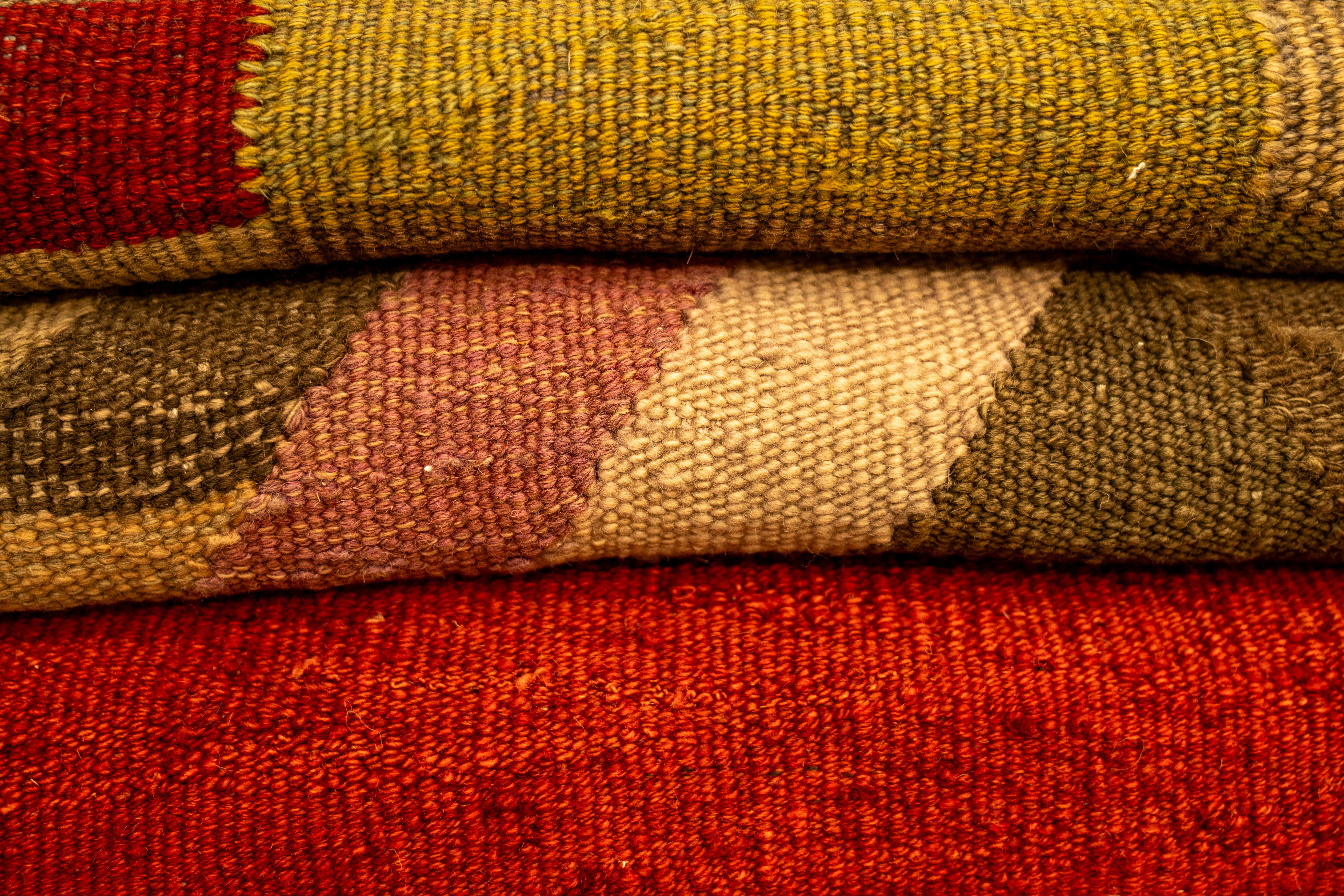 Stack of Folded Rugs · Free Stock Photo