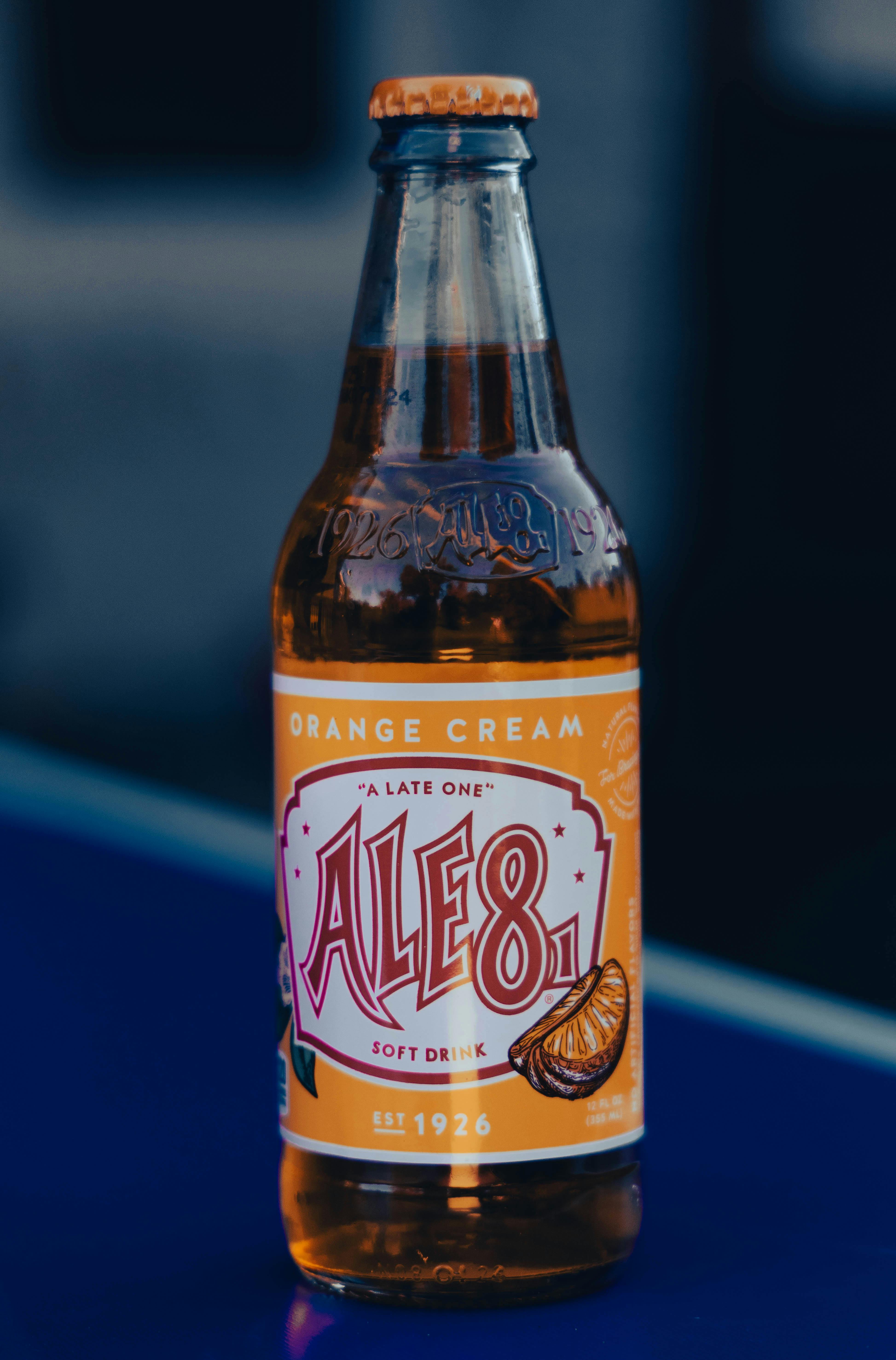 A bottle of ale 8 on a table · Free Stock Photo