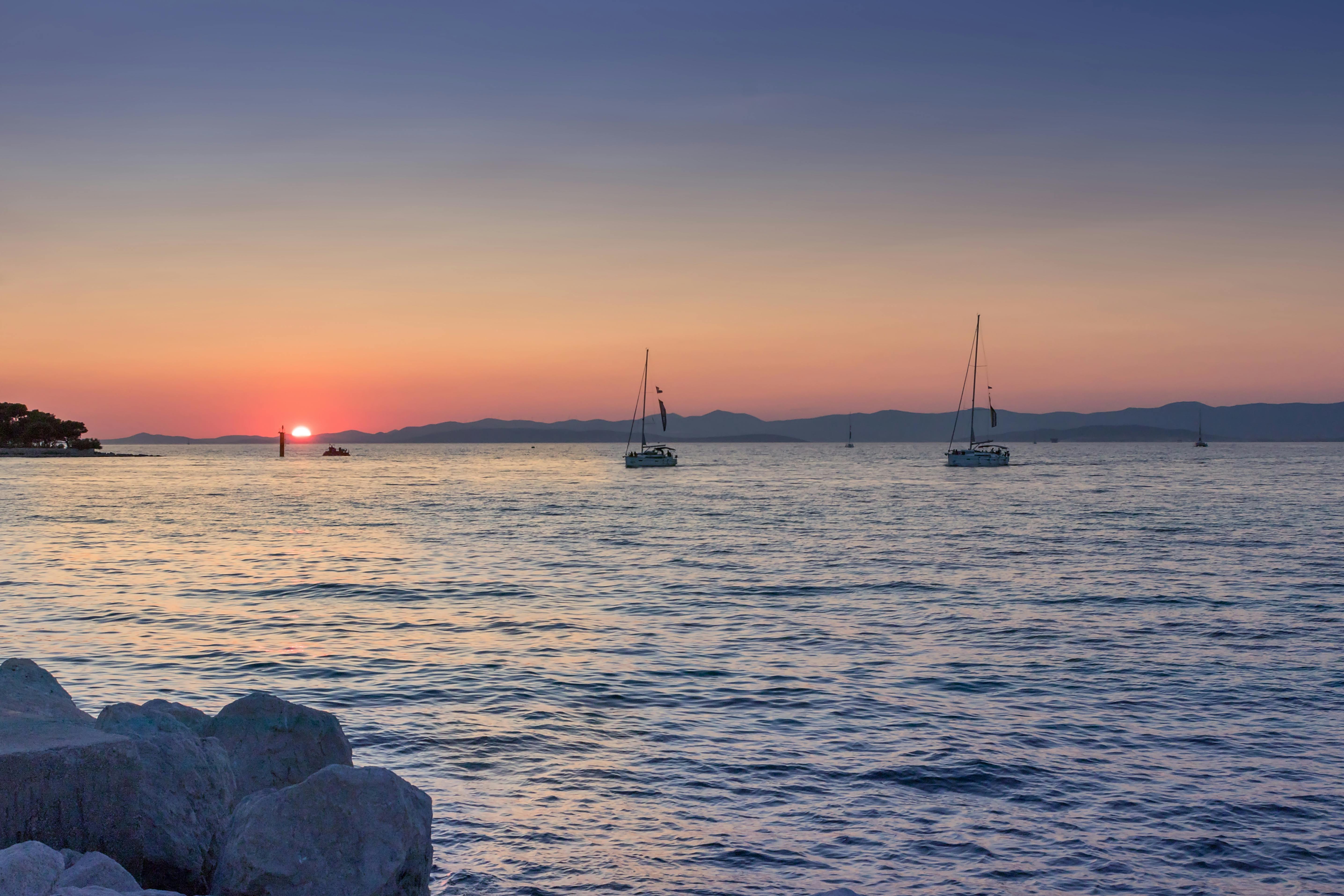 Photo Of Boats During Dawn · Free Stock Photo