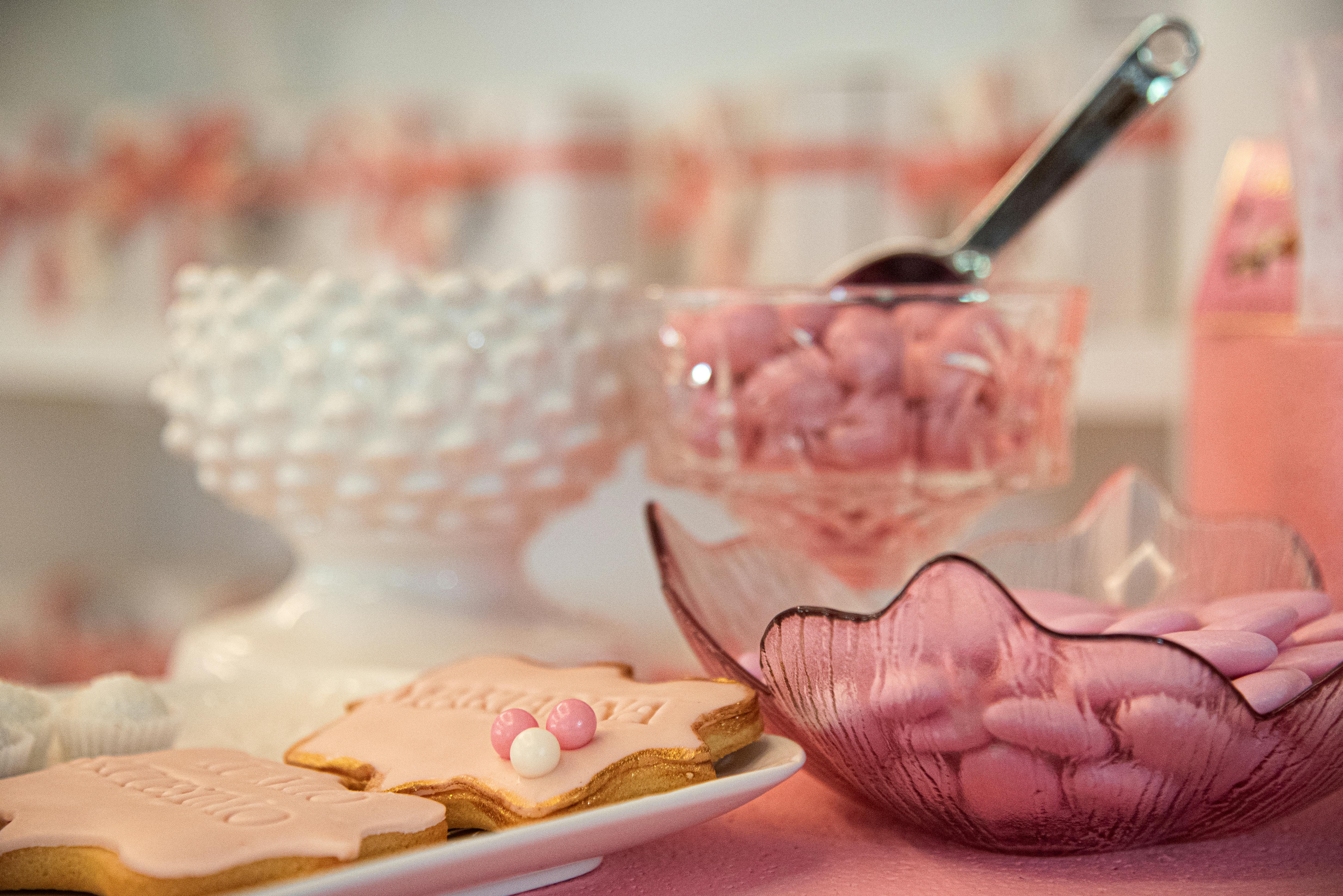 Pink and white dessert table with cookies and candy · Free Stock Photo