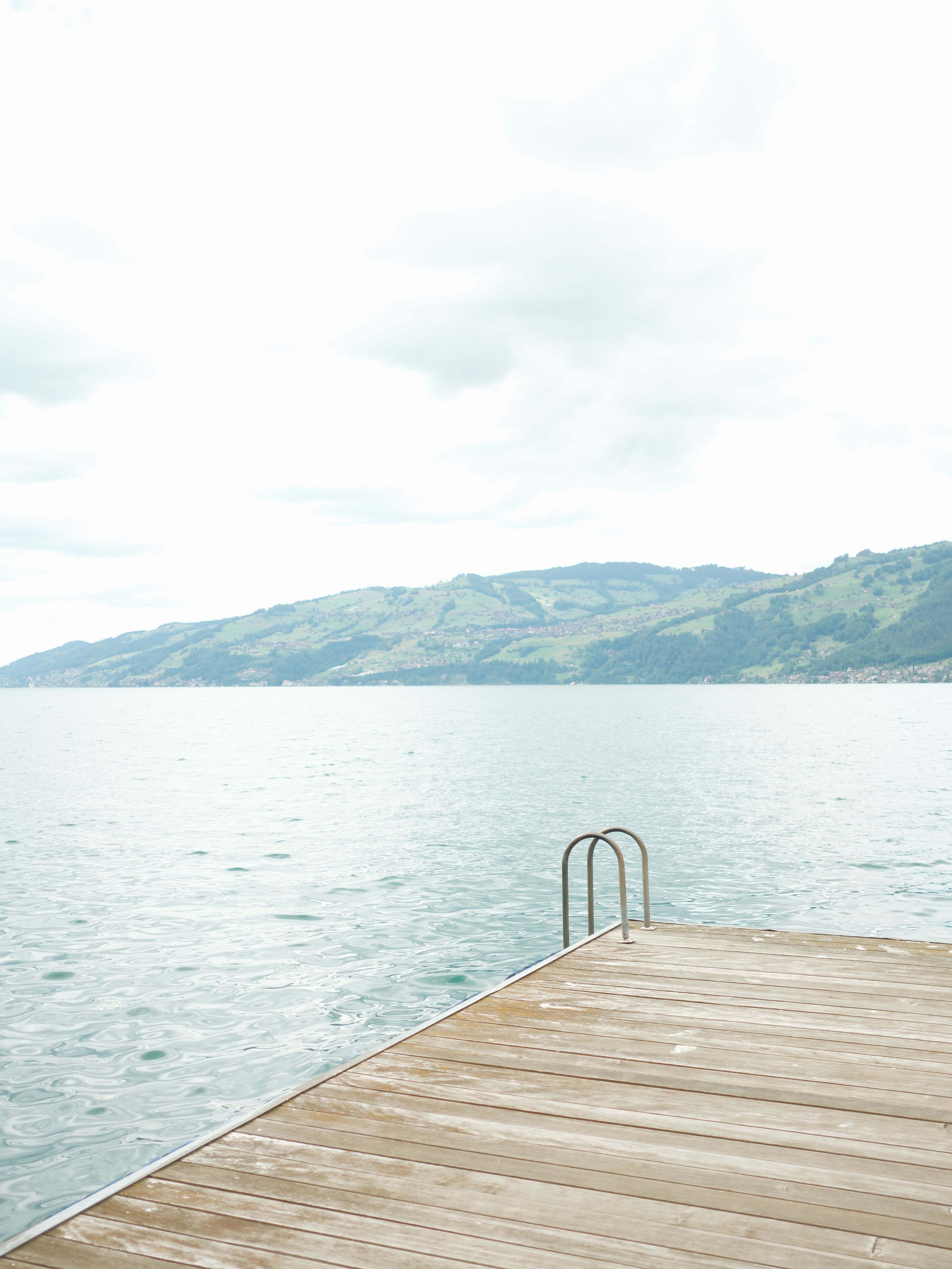 A wooden pier with a view of the water · Free Stock Photo