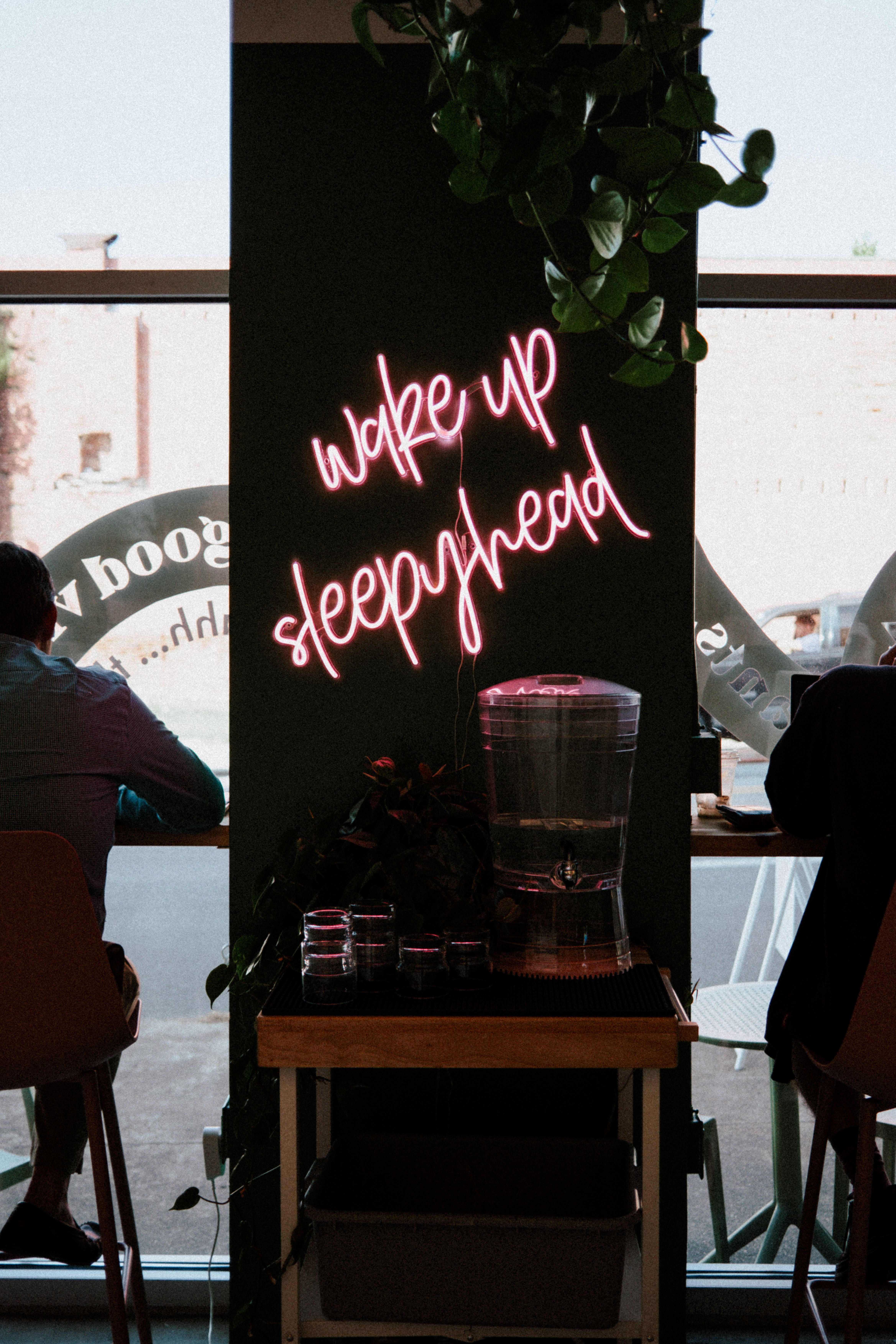 A neon sign that says wake up, keep busy · Free Stock Photo