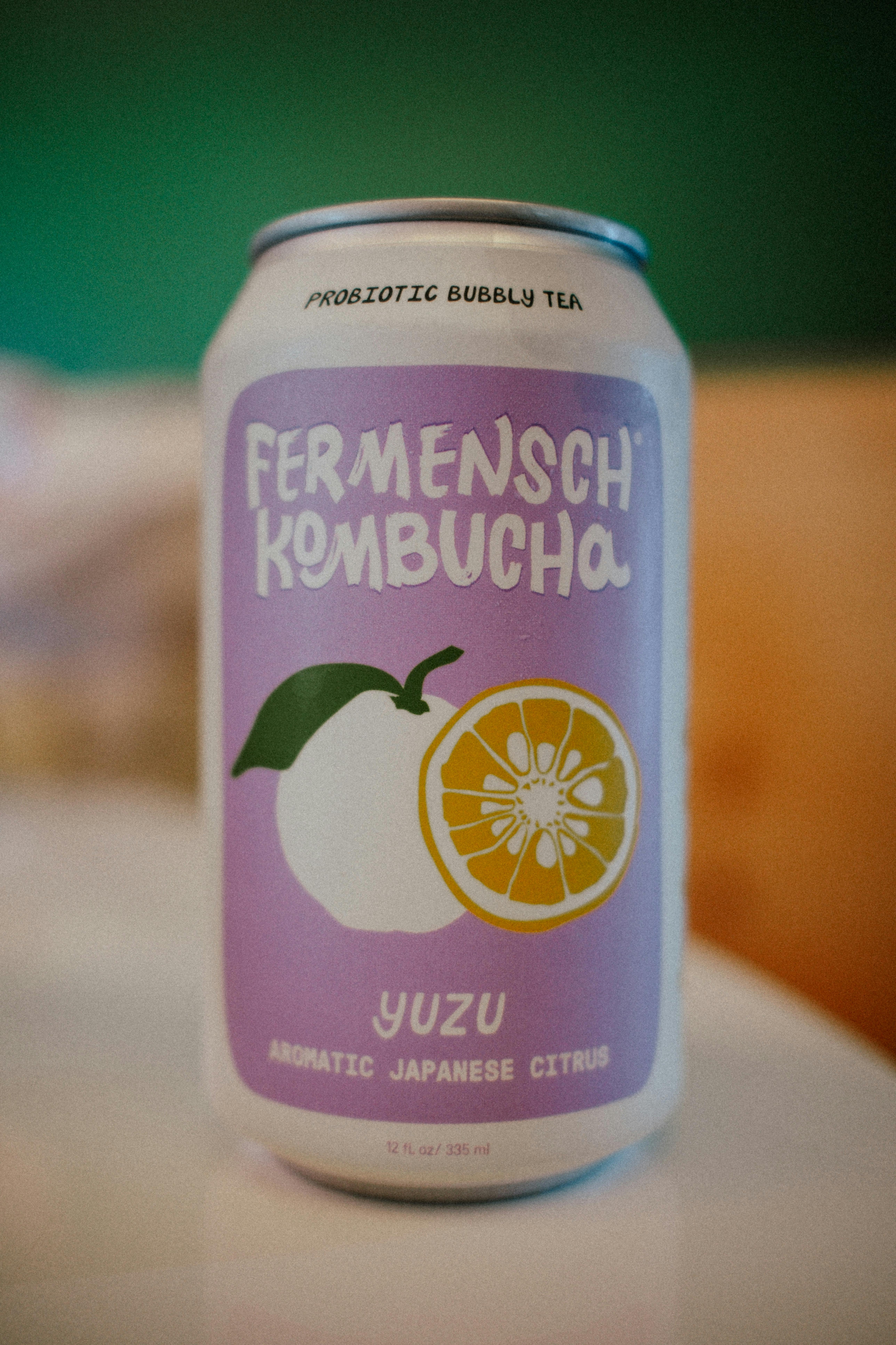 A can of kombucha on a table · Free Stock Photo