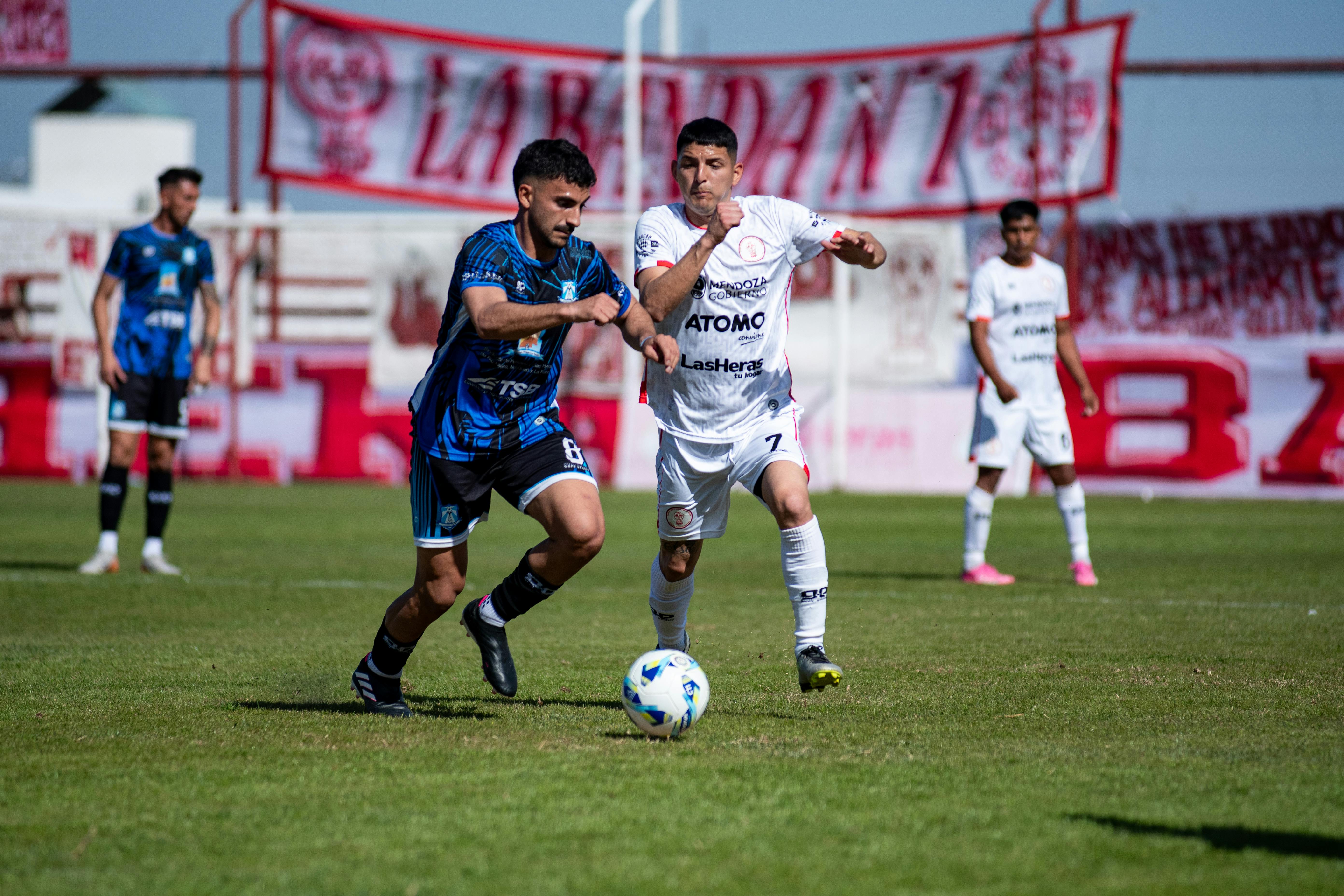 Group of Men Playing Soccer · Free Stock Photo