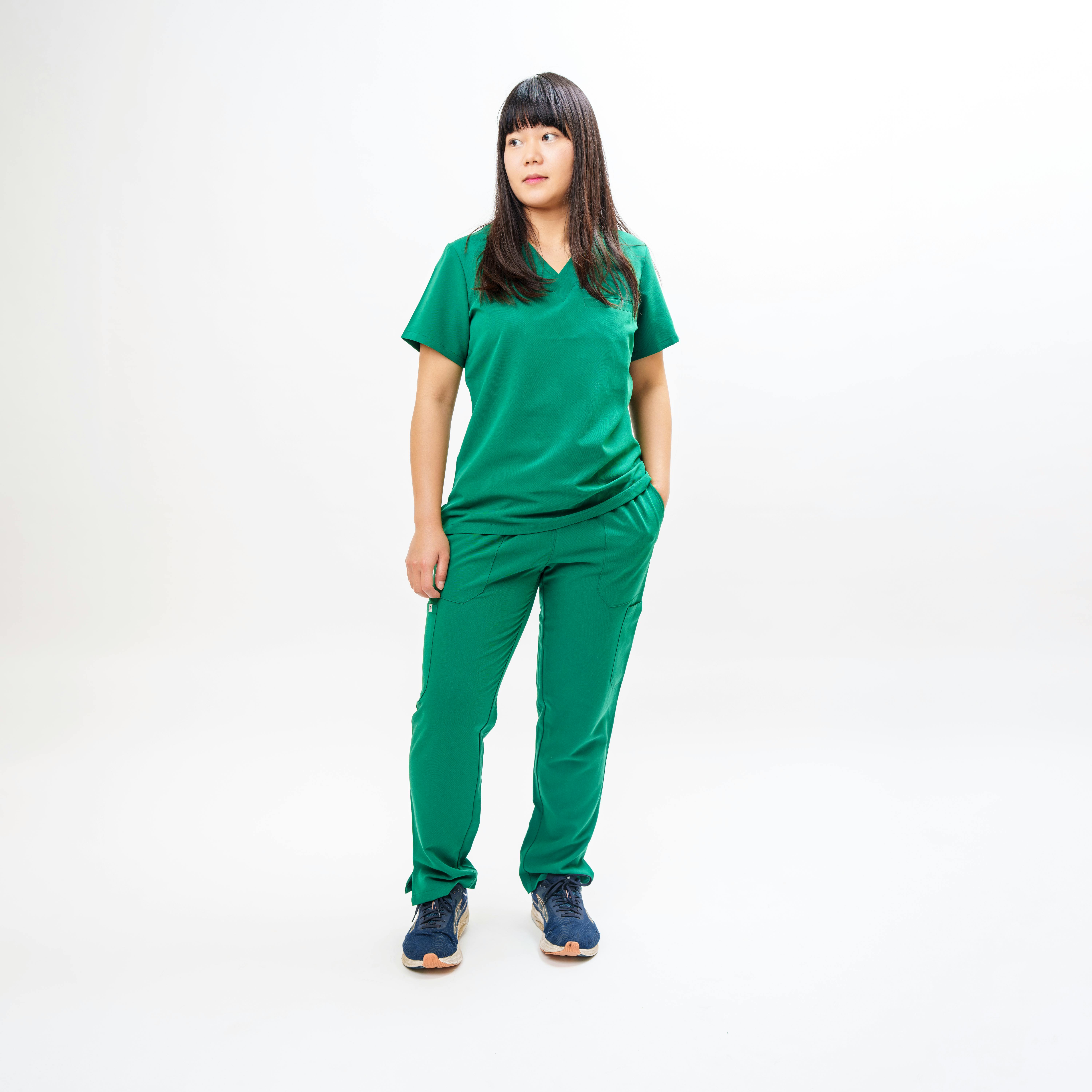 Young Asian Doctor Wearing Green Scrubs Studio Standing White ...