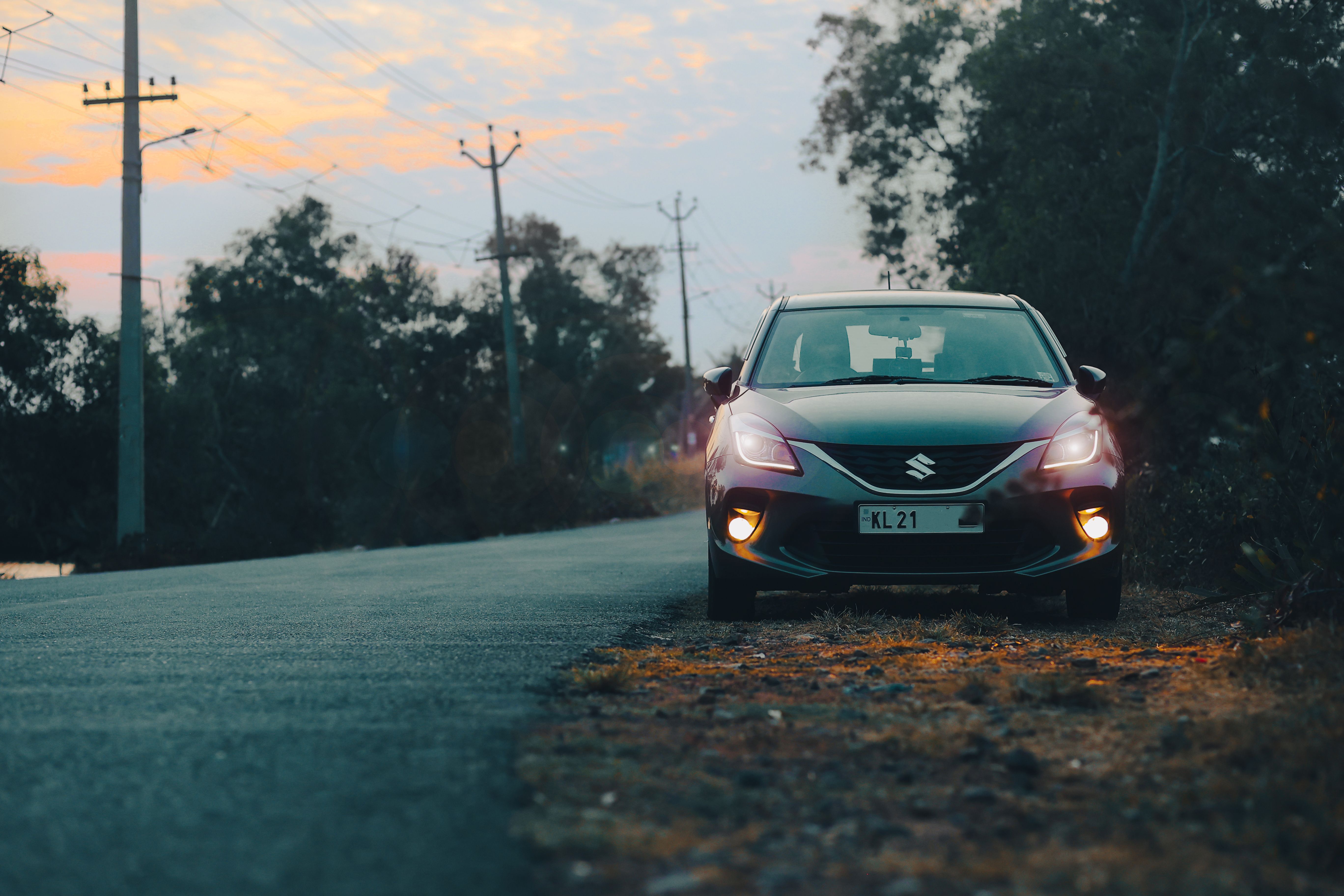 Car Parked on a Scenic Rural Road at Dusk · Free Stock Photo
