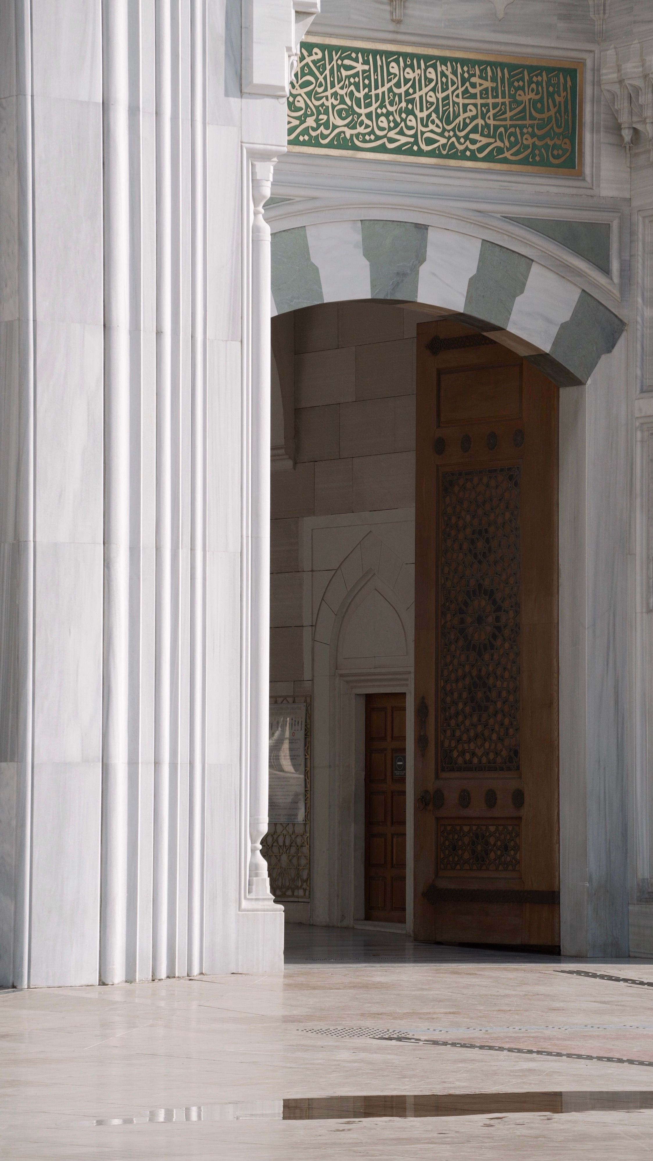 Intricate Islamic Architecture Marble Entrance · Free Stock Photo