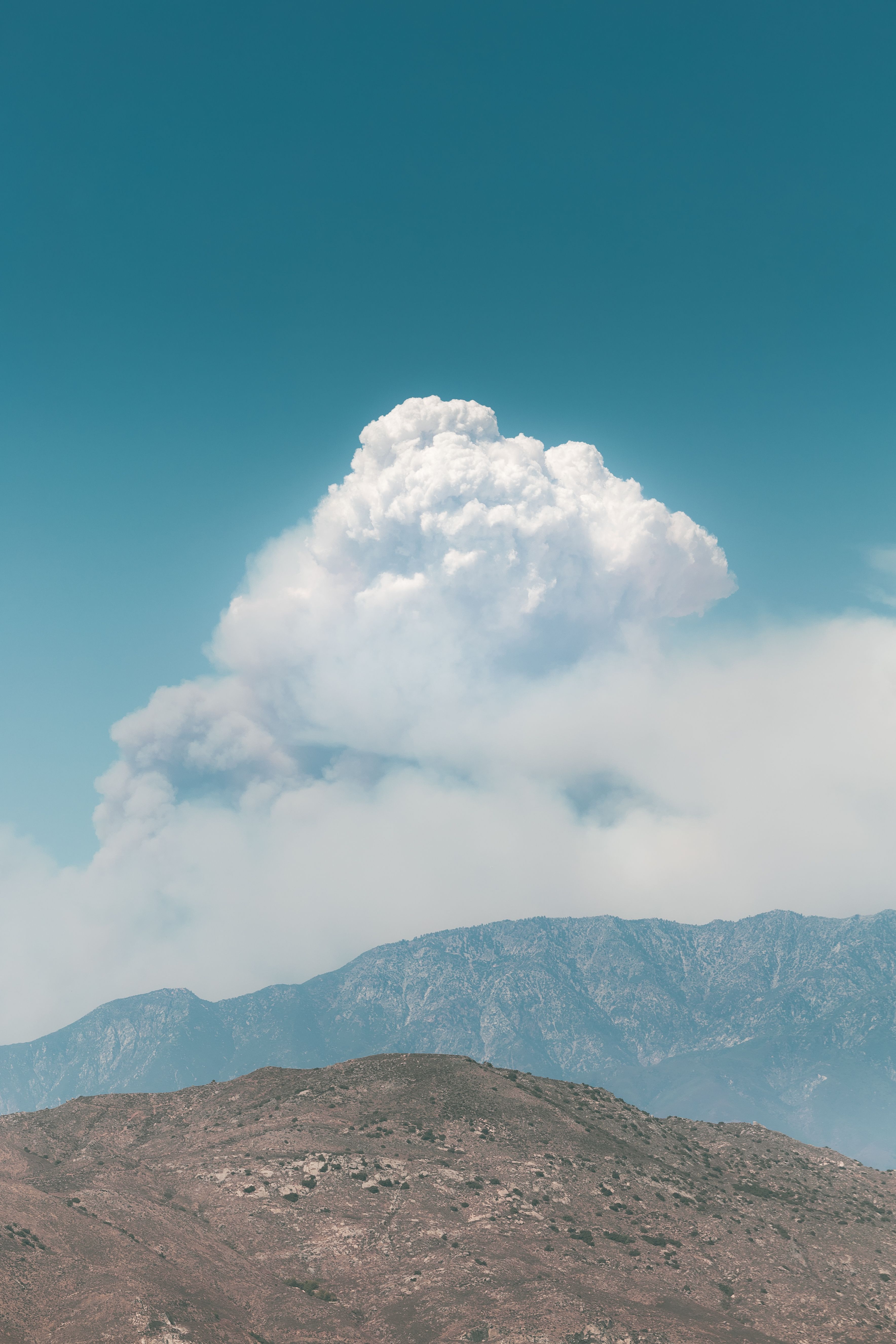 Majestic Cloud Formation Over Mountain Range · Free Stock Photo