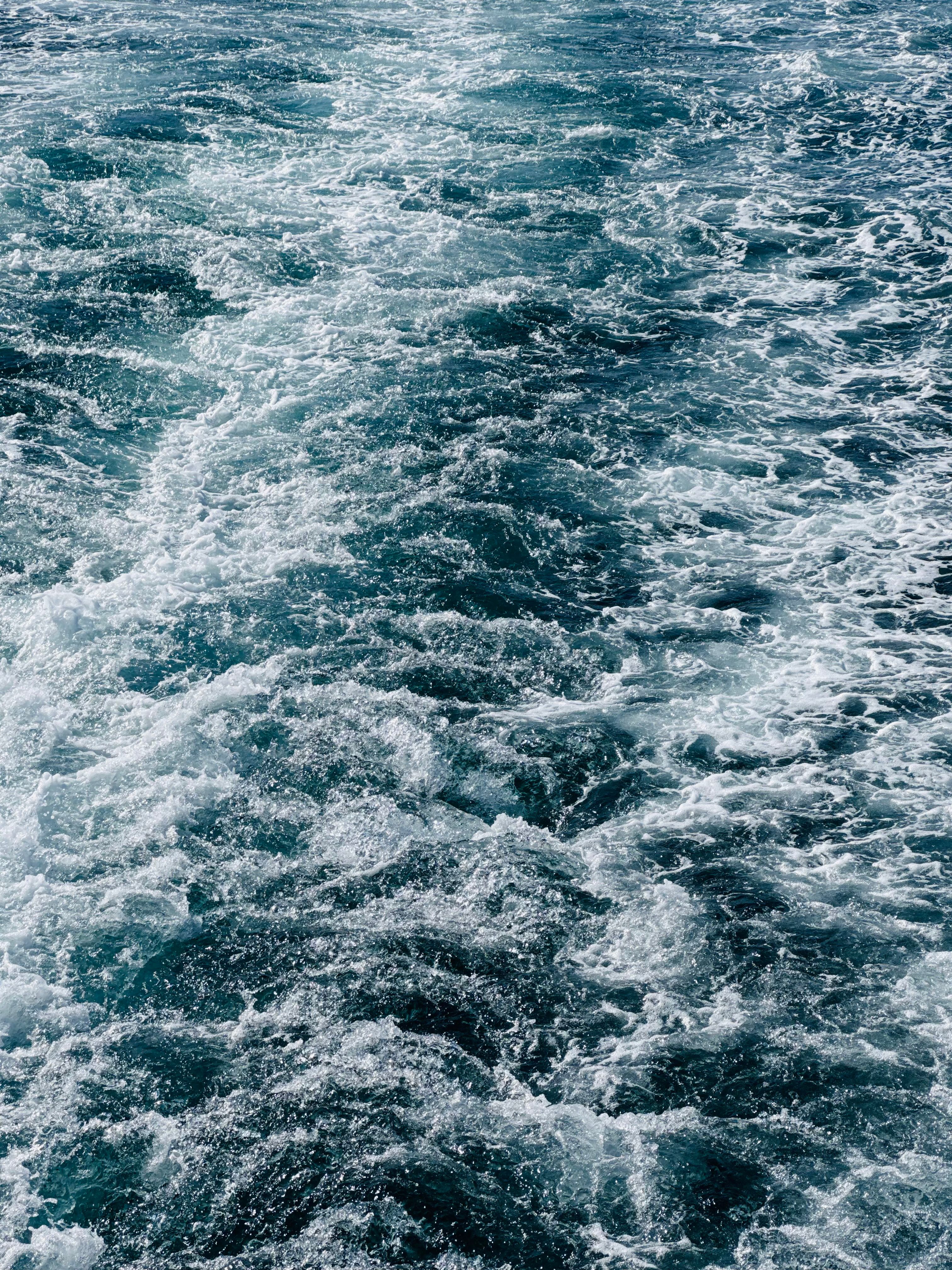 Waves behind cruise ship sailing on sea · Free Stock Photo