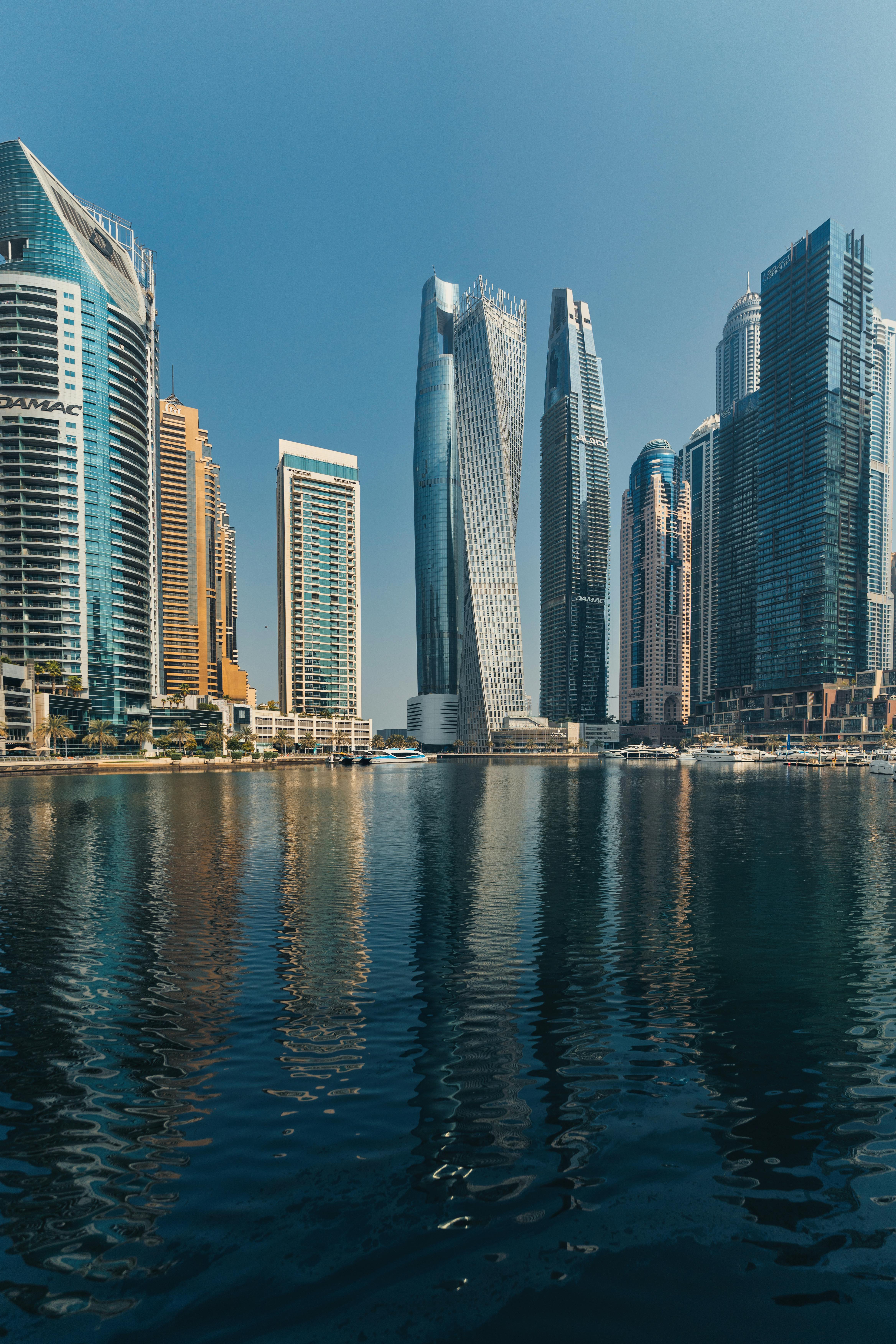 Ciel Tower Between Skyscrapers at Dubai Marina in UAE · Free Stock Photo