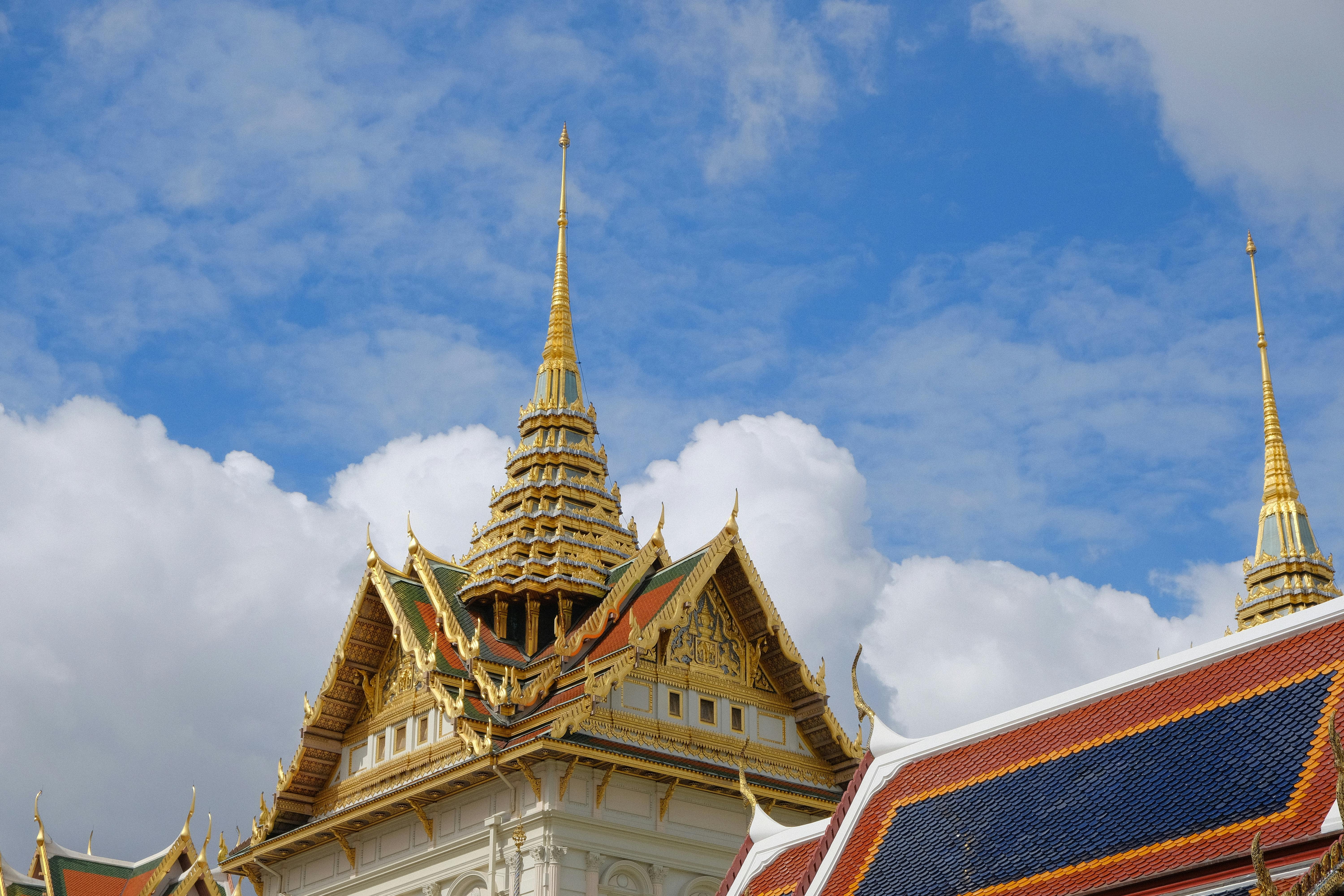 Roof of Grand Palace against Blue Sky in Bangkok, Thailand · Free Stock Photo