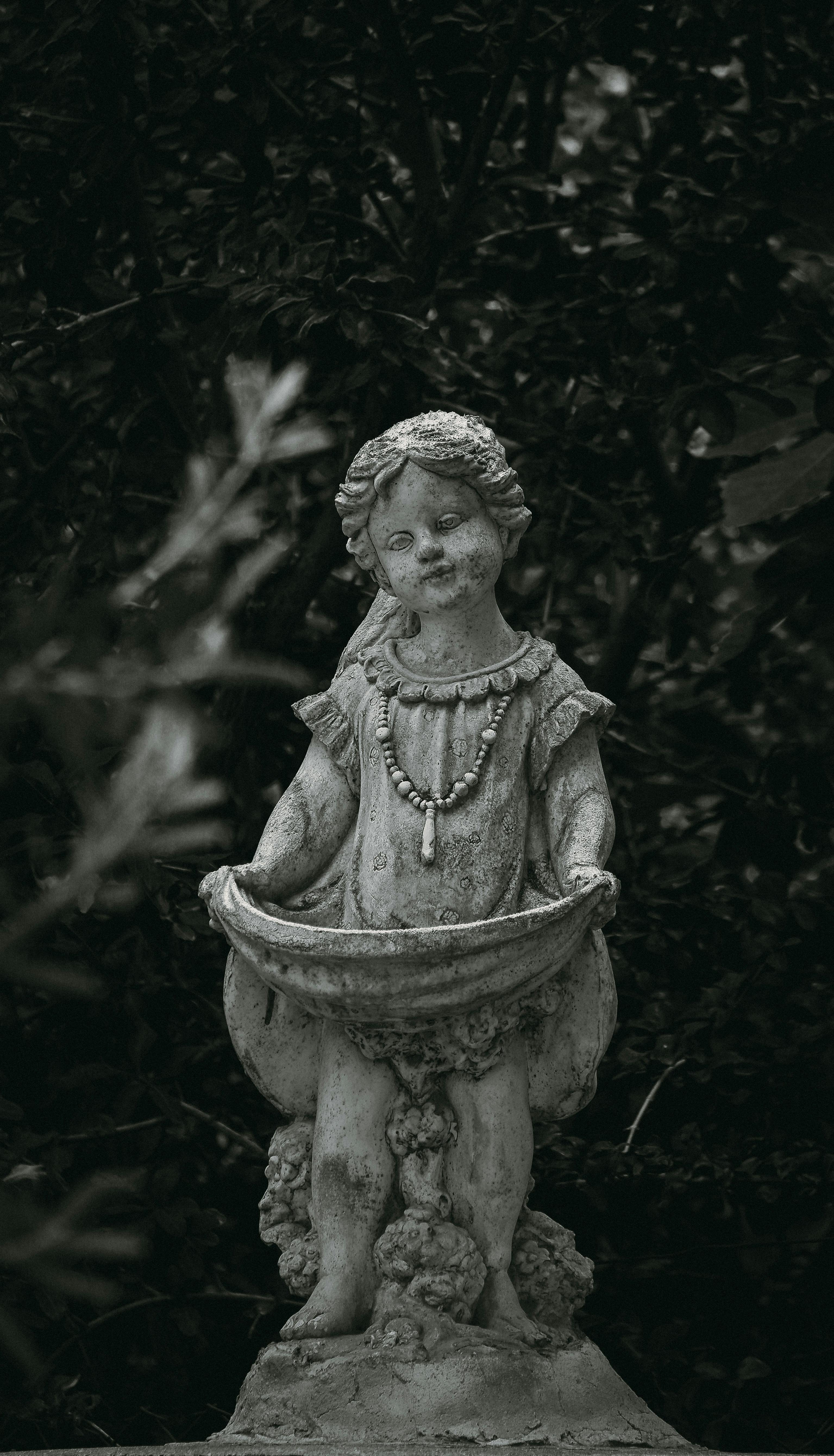 Stone Statue of Child in Park · Free Stock Photo