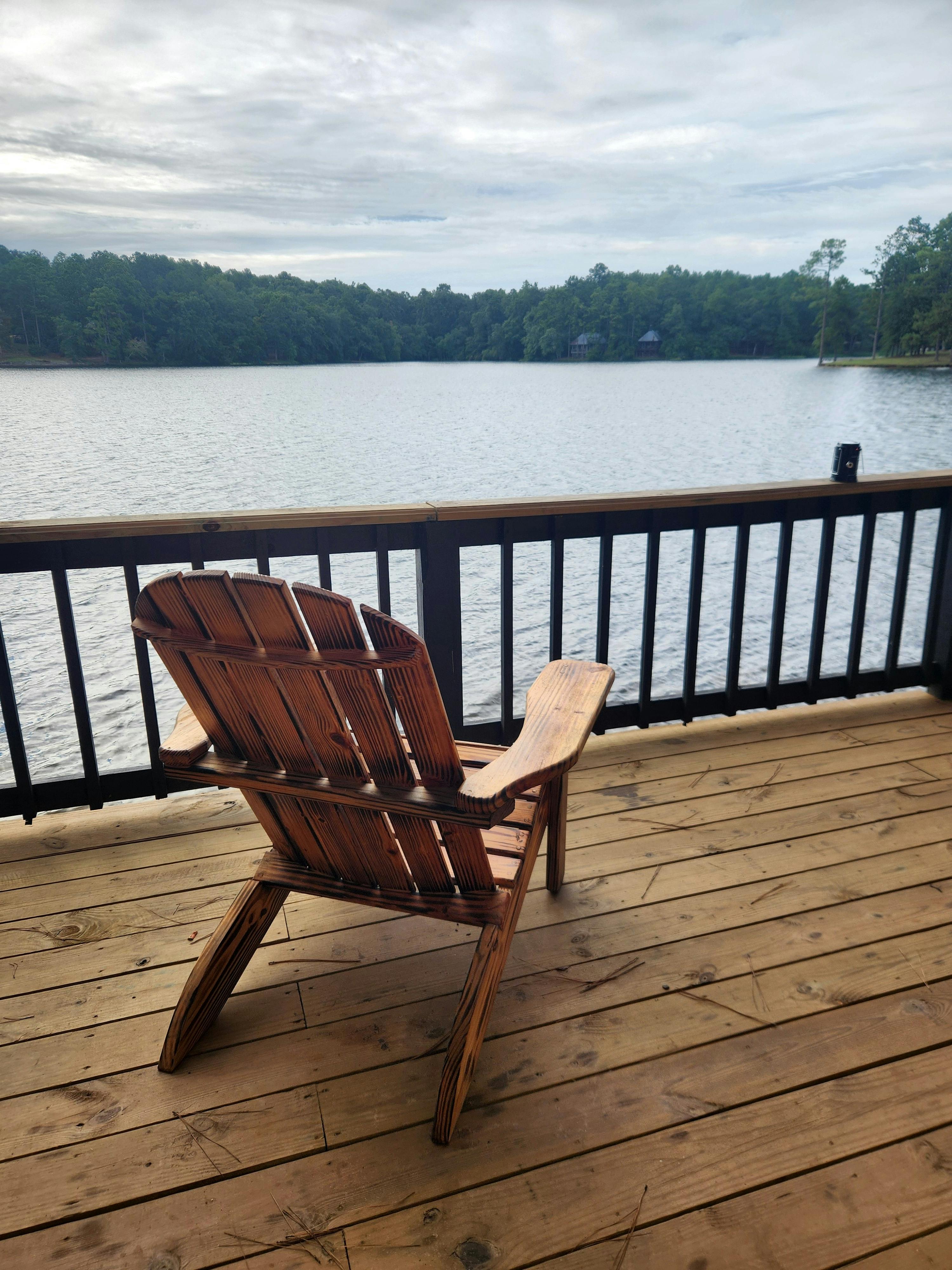Serene Lakeside View with Adirondack Chair · Free Stock Photo