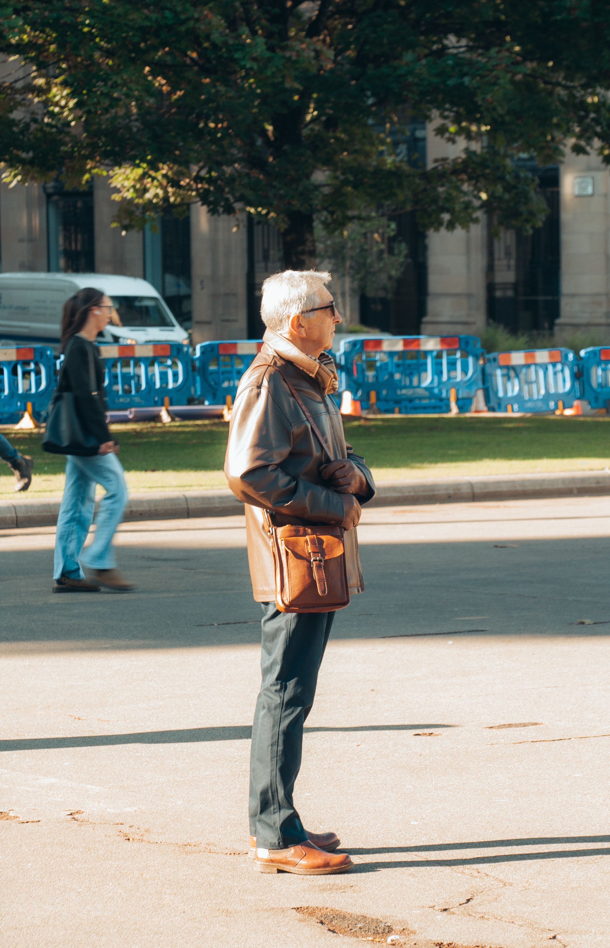 Old Man Standing on the Pavement in a City · Free Stock Photo