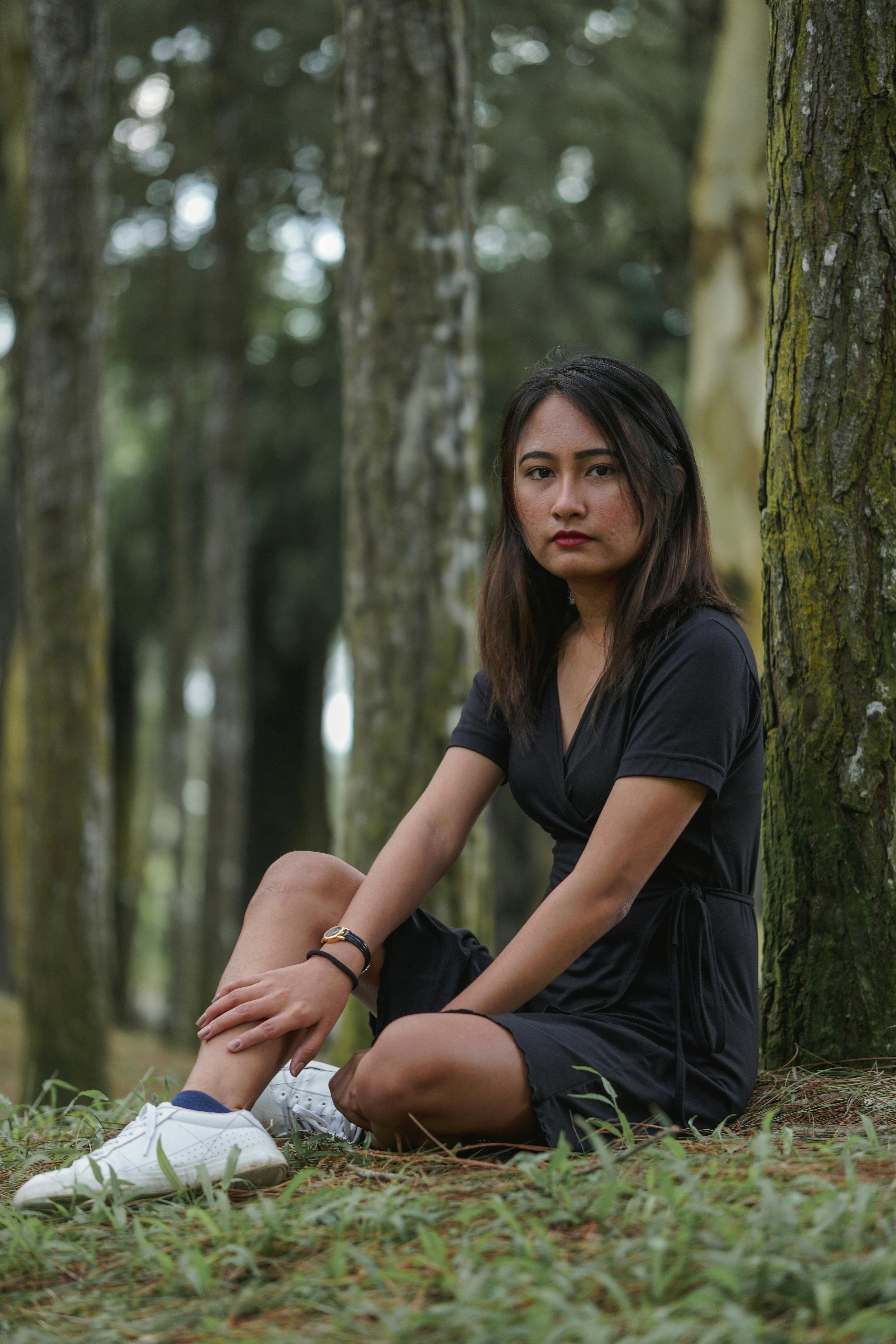 Women Sitting Beside Tree · Free Stock Photo