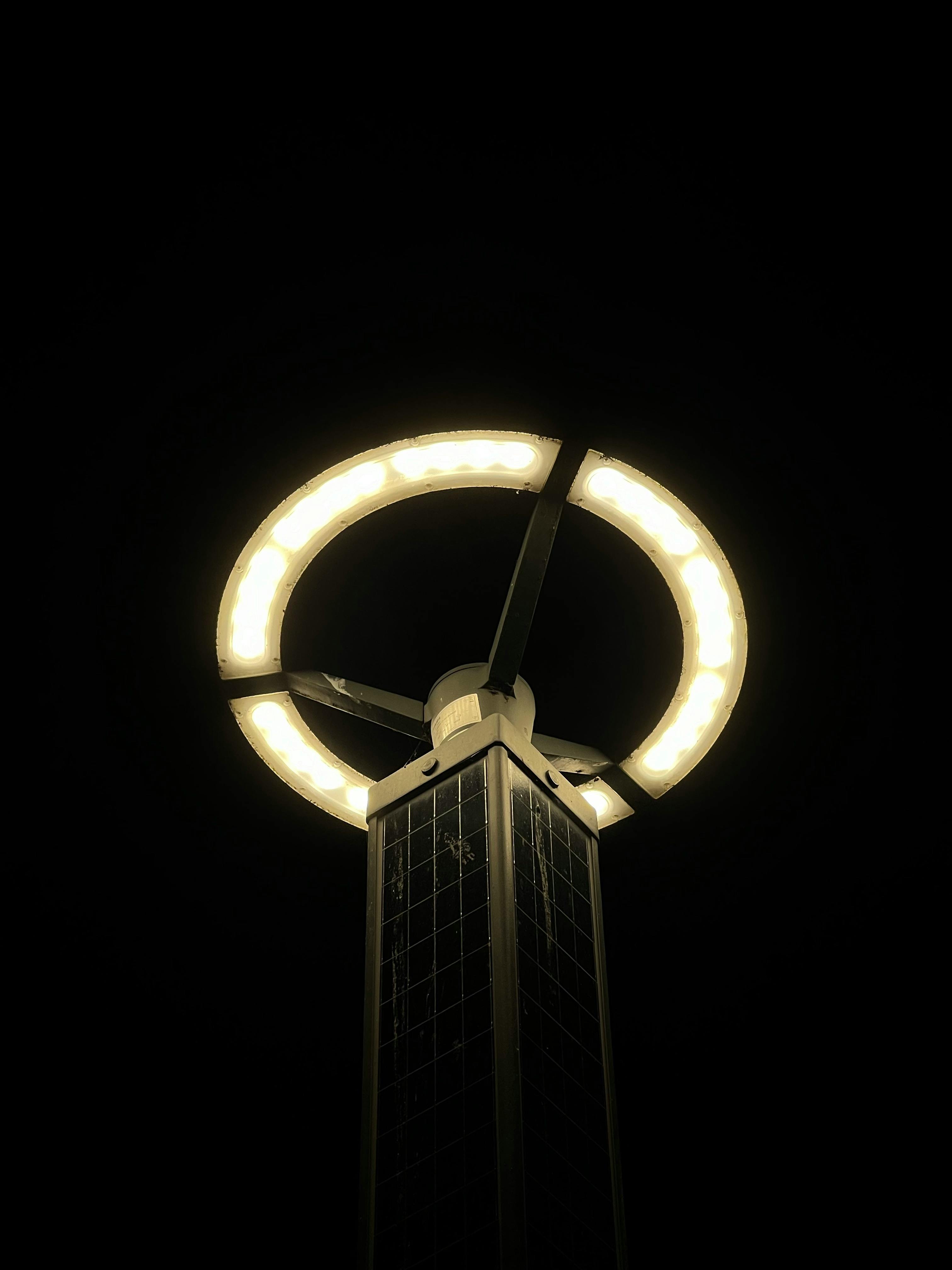 Ring Streetlight on a Pole with Solar Panels · Free Stock Photo